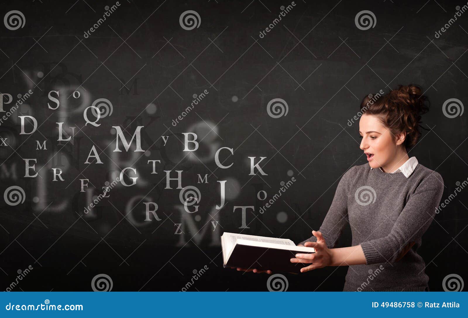 Young Lady Reading a Book with Alphabet Letters Stock Photo - Image of ...