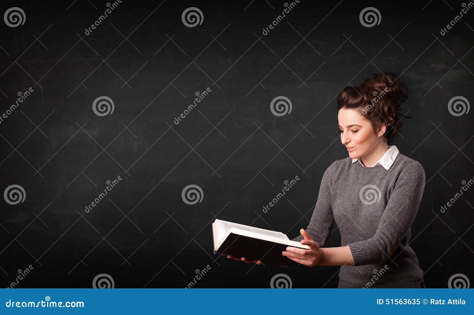 Young lady reading a book stock image. Image of elegant - 51563635