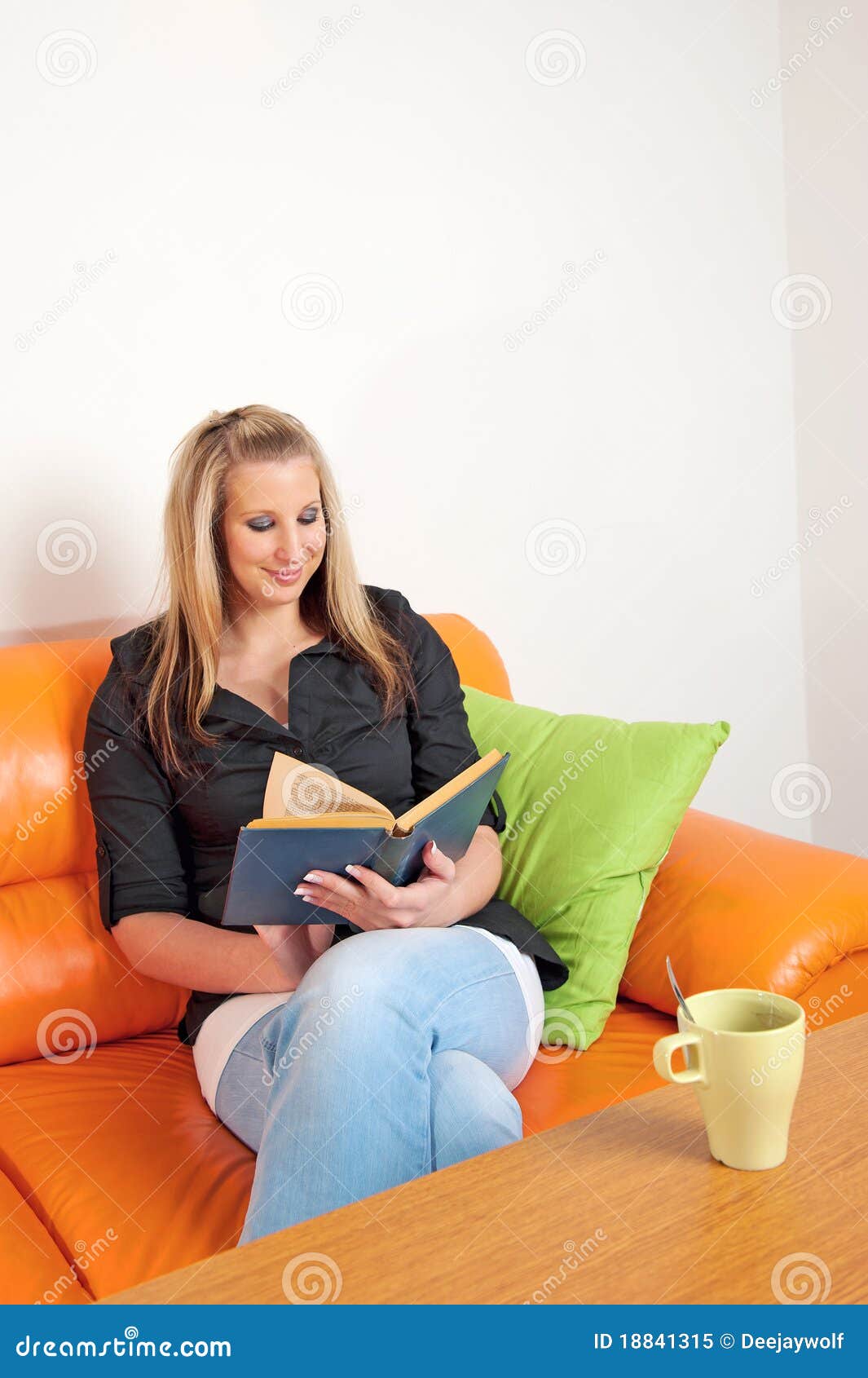 Young Lady Reading an Old Book Stock Image - Image of bright, grey ...