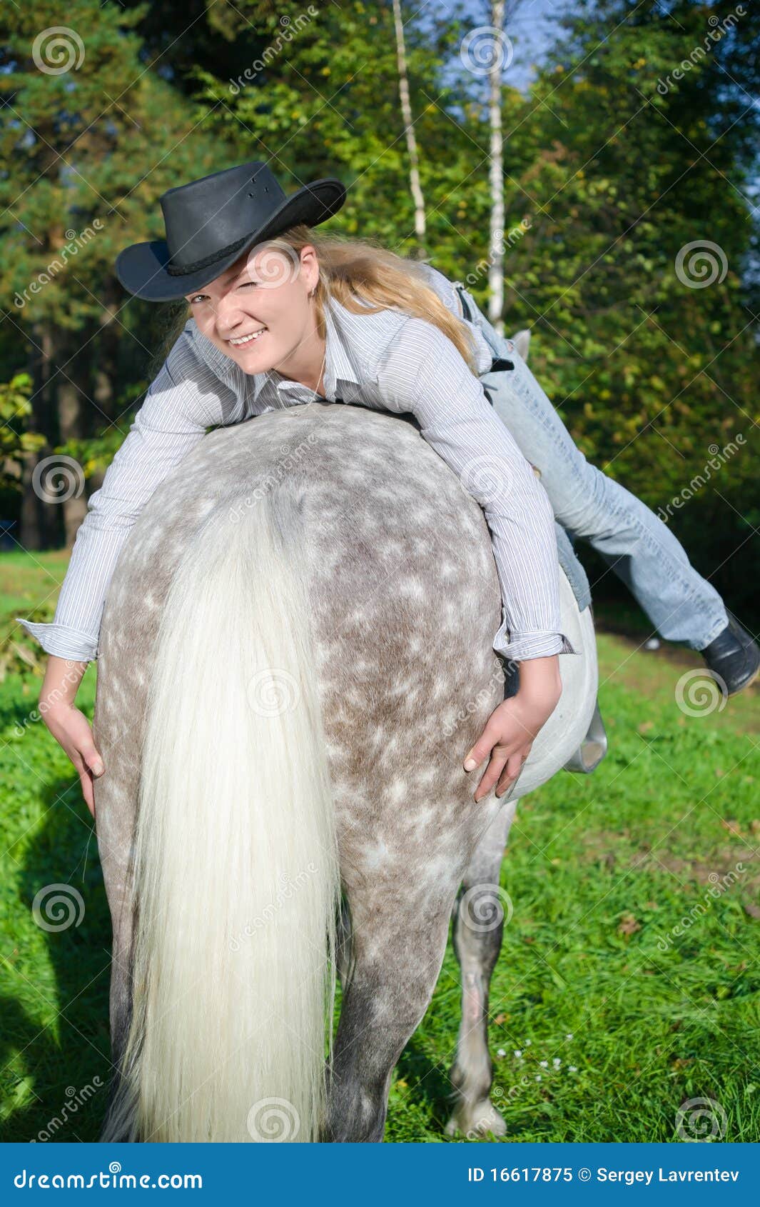 Young Lady riding a horse stock image. Image of ranch - 16617875