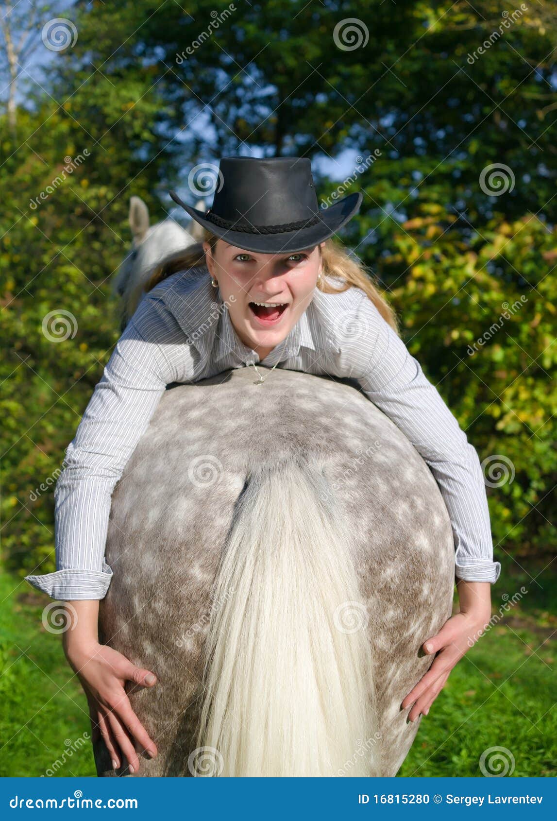 Young Lady riding a horse stock photo. Image of person - 16815280