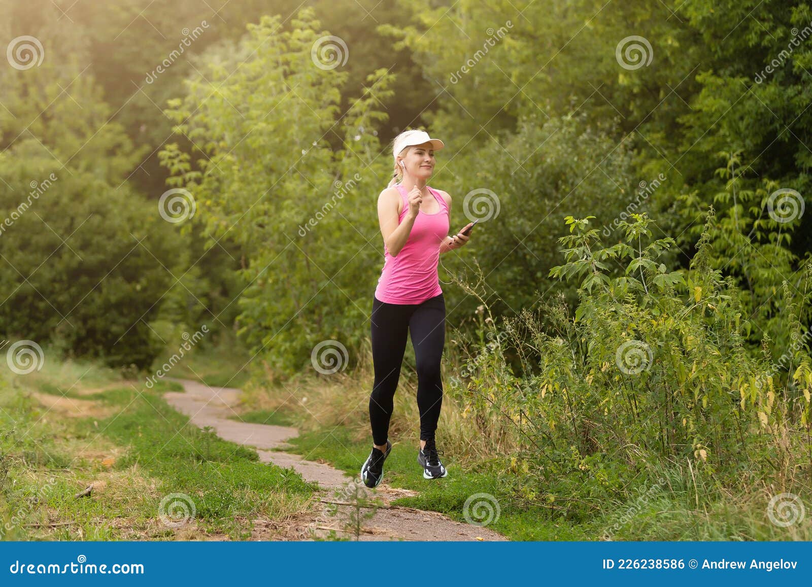 Young Lady Running on a Rural Road. Stock Photo - Image of female ...