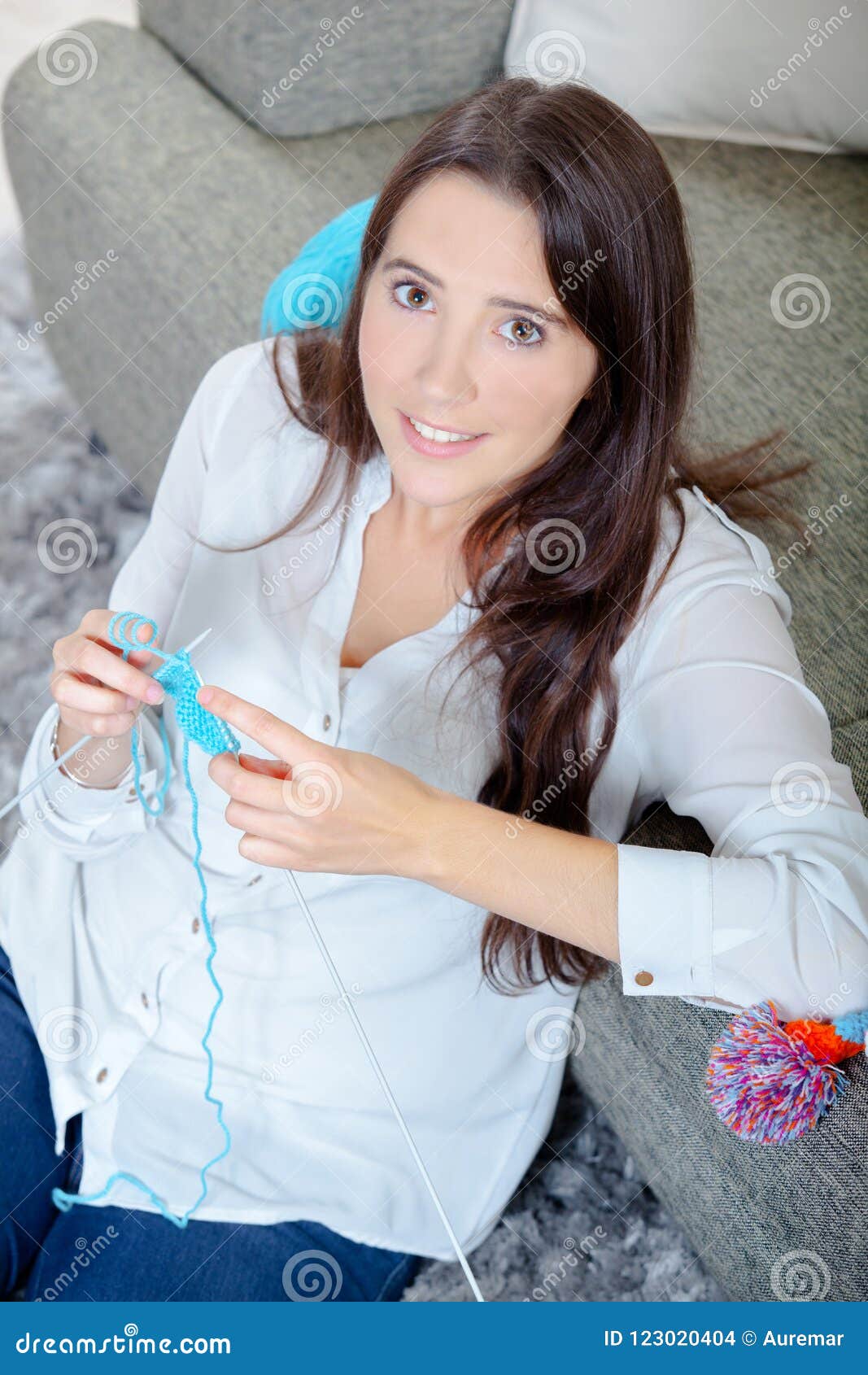 Young Lady Sat on Floor Knitting Stock Photo - Image of hand, sitting ...
