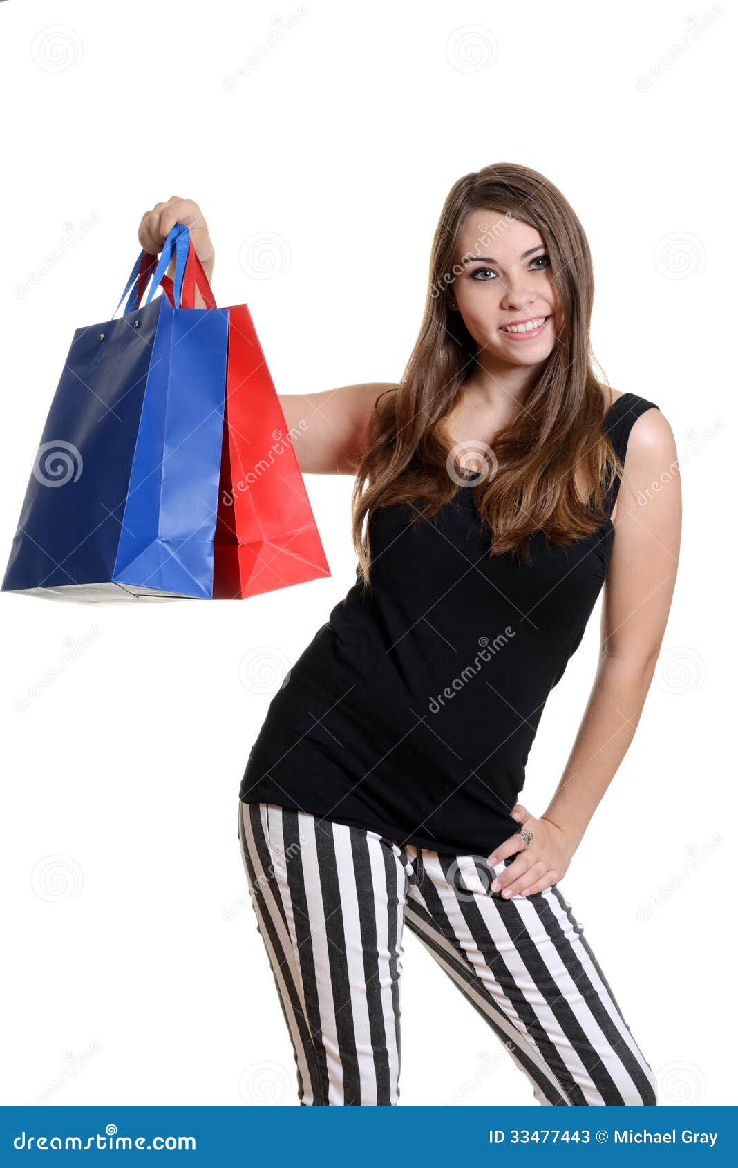 Young Lady with Shopping Bags Stock Image - Image of carrying, pants ...