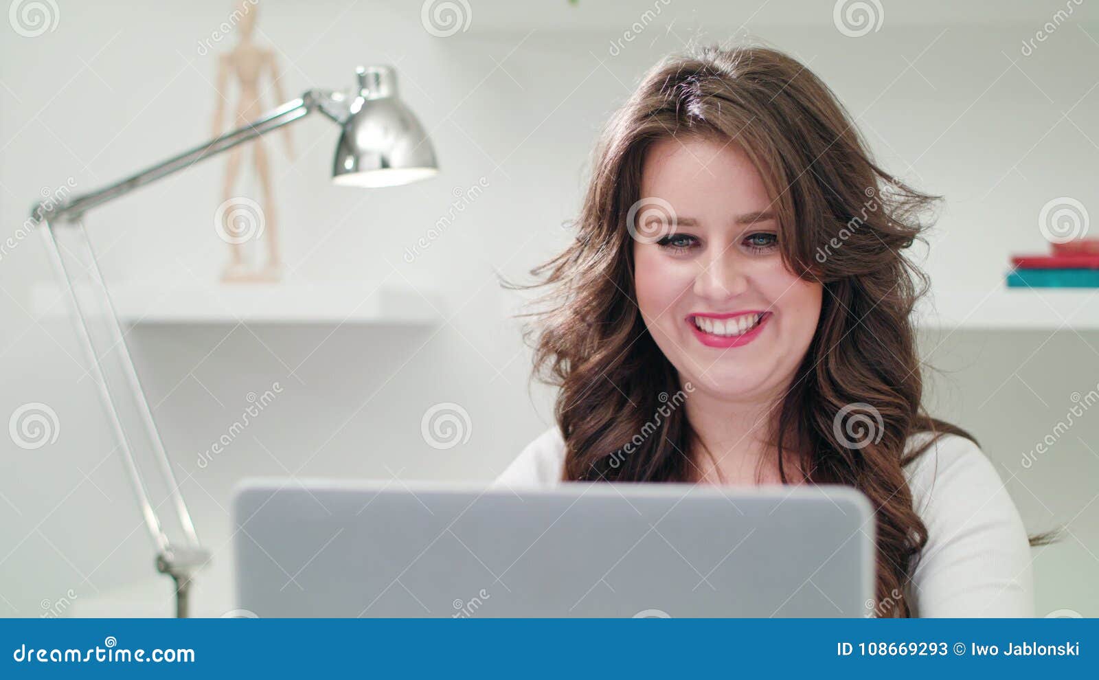 A Young Lady Using a Computer Indoors Stock Image - Image of beautiful ...