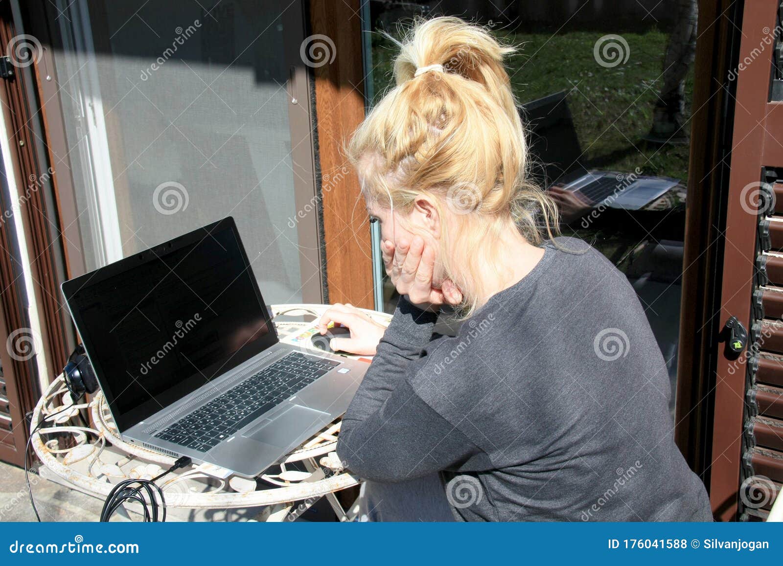 Young Lady Working from Home in Front of the House Stock Photo - Image ...