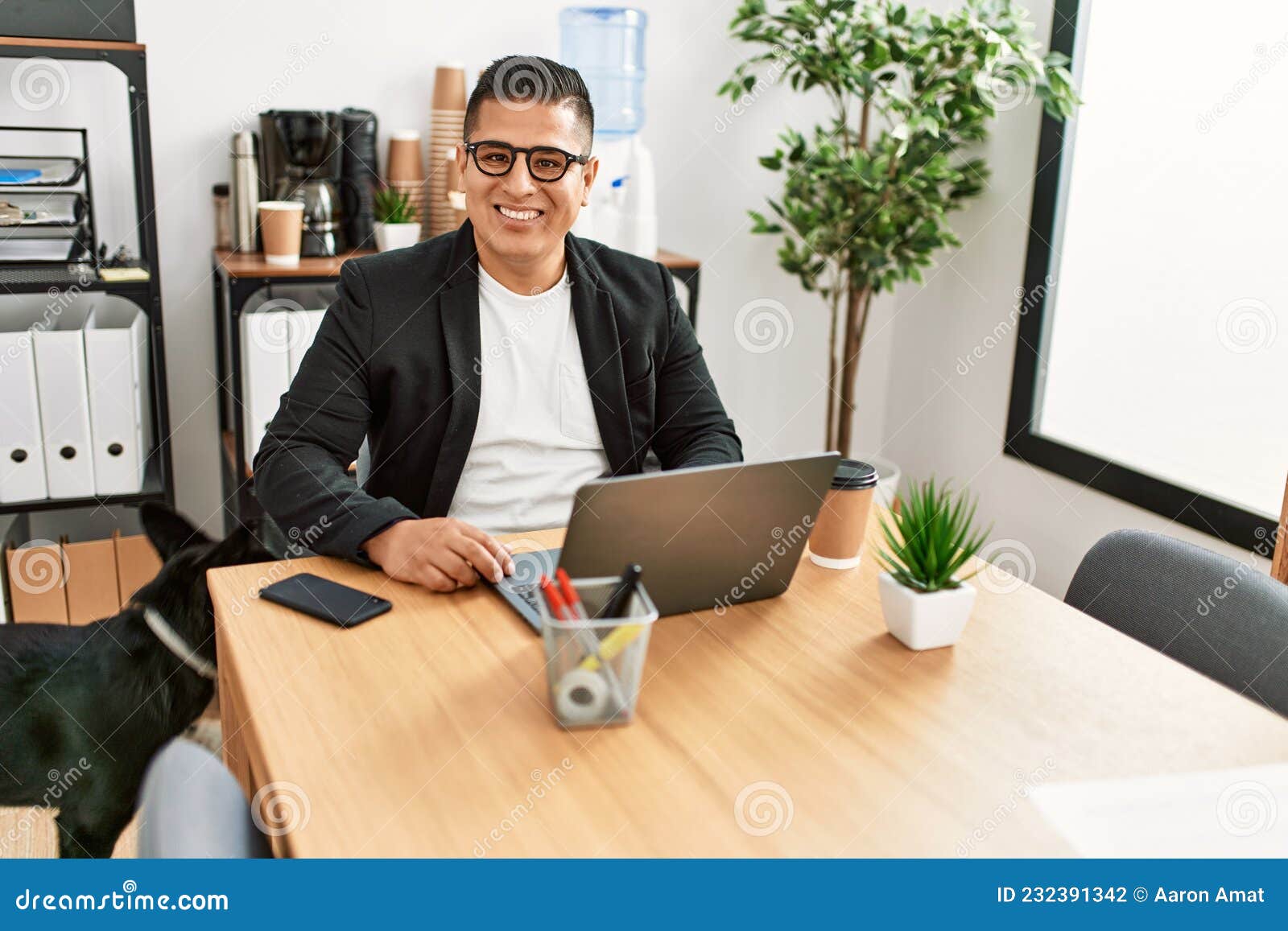 Young Latin Businessman Smiling Happy Working Using Laptop at the ...