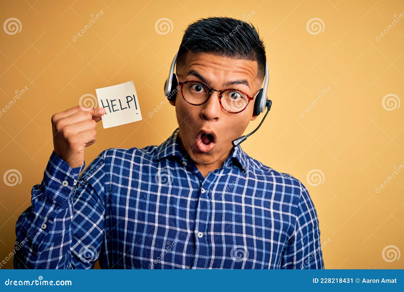 Young Latin Call Center Agent Man Overworked Holding Help Message Paper ...