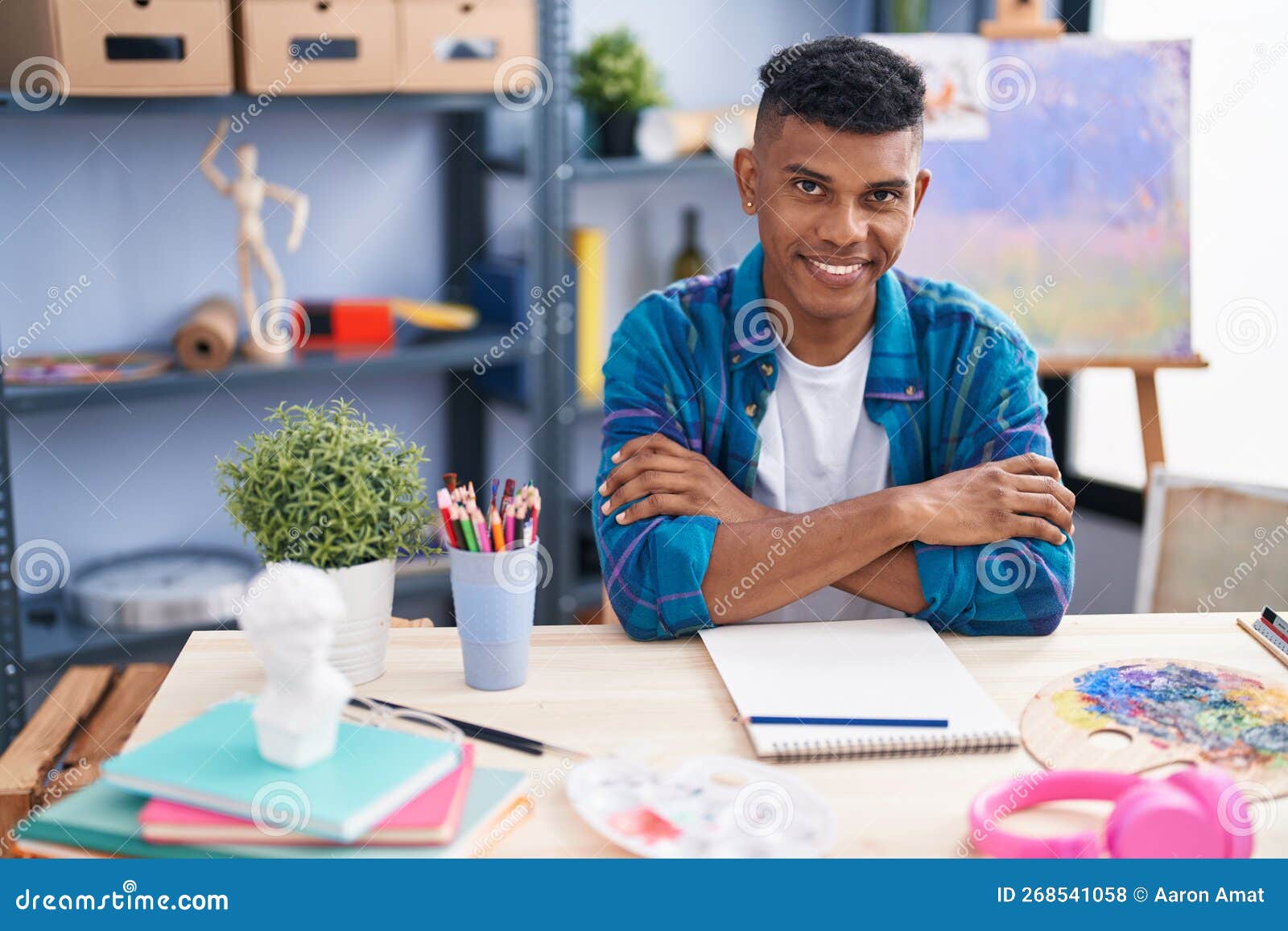 Young Latin Man Artist Smiling Confident Drawing on Notebook at Art ...