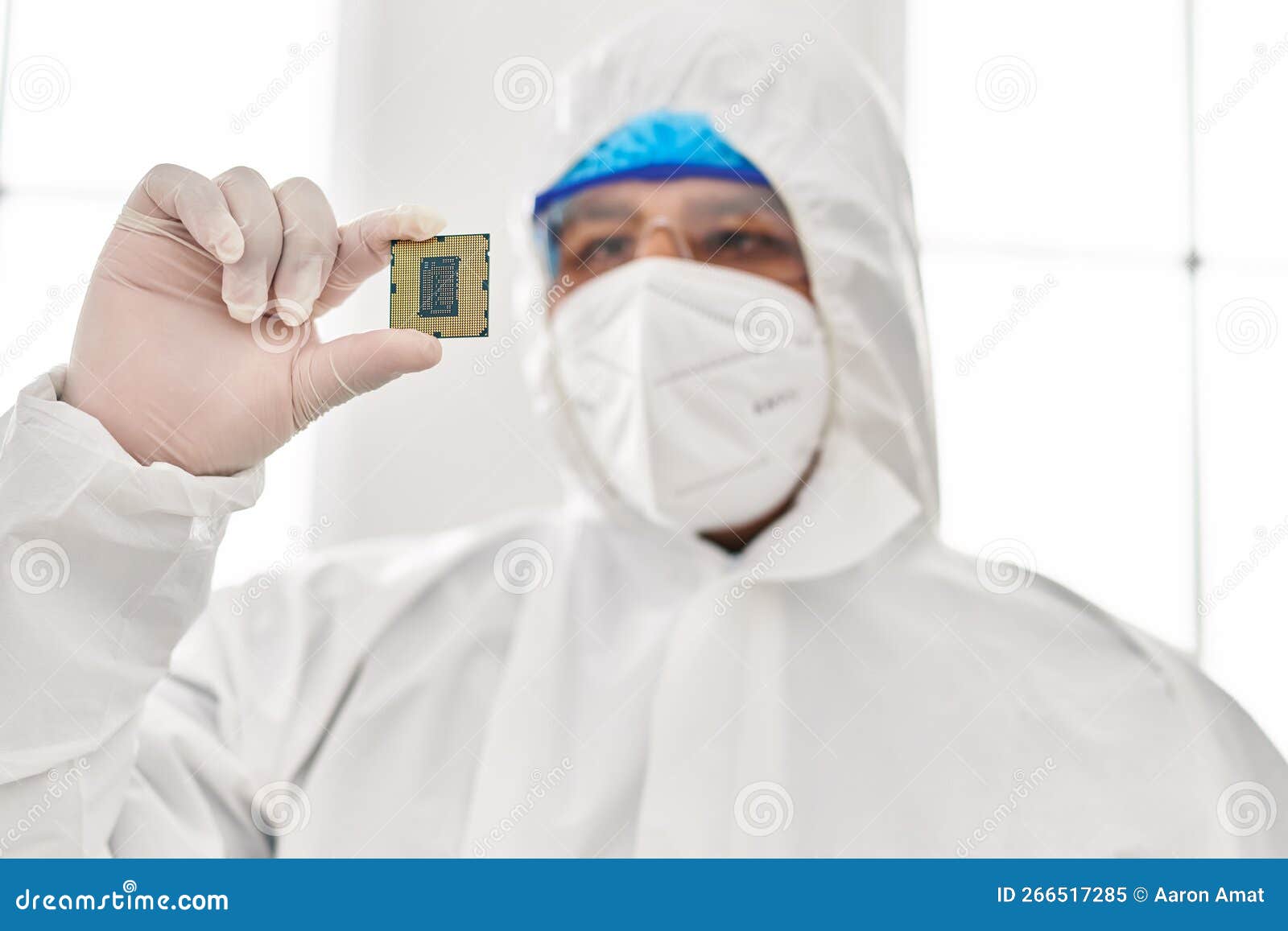 Young Latin Man Scientist Wearing Covid Protection Uniform Holding Cpu ...