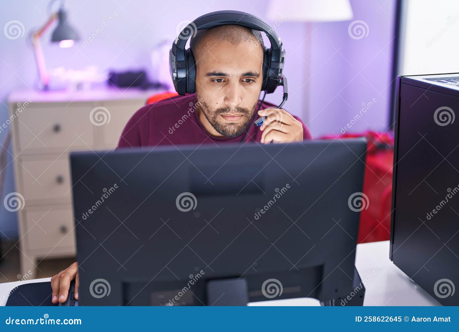 Young Latin Man Streamer Playing Video Game Using Computer at Gaming ...