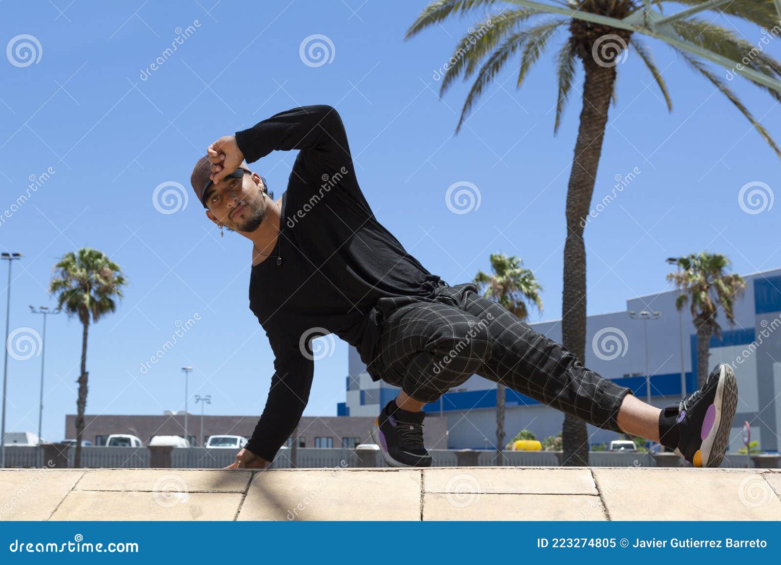 Latin Man Urban Acrobatic Dancer on the Street Doing a Performance ...