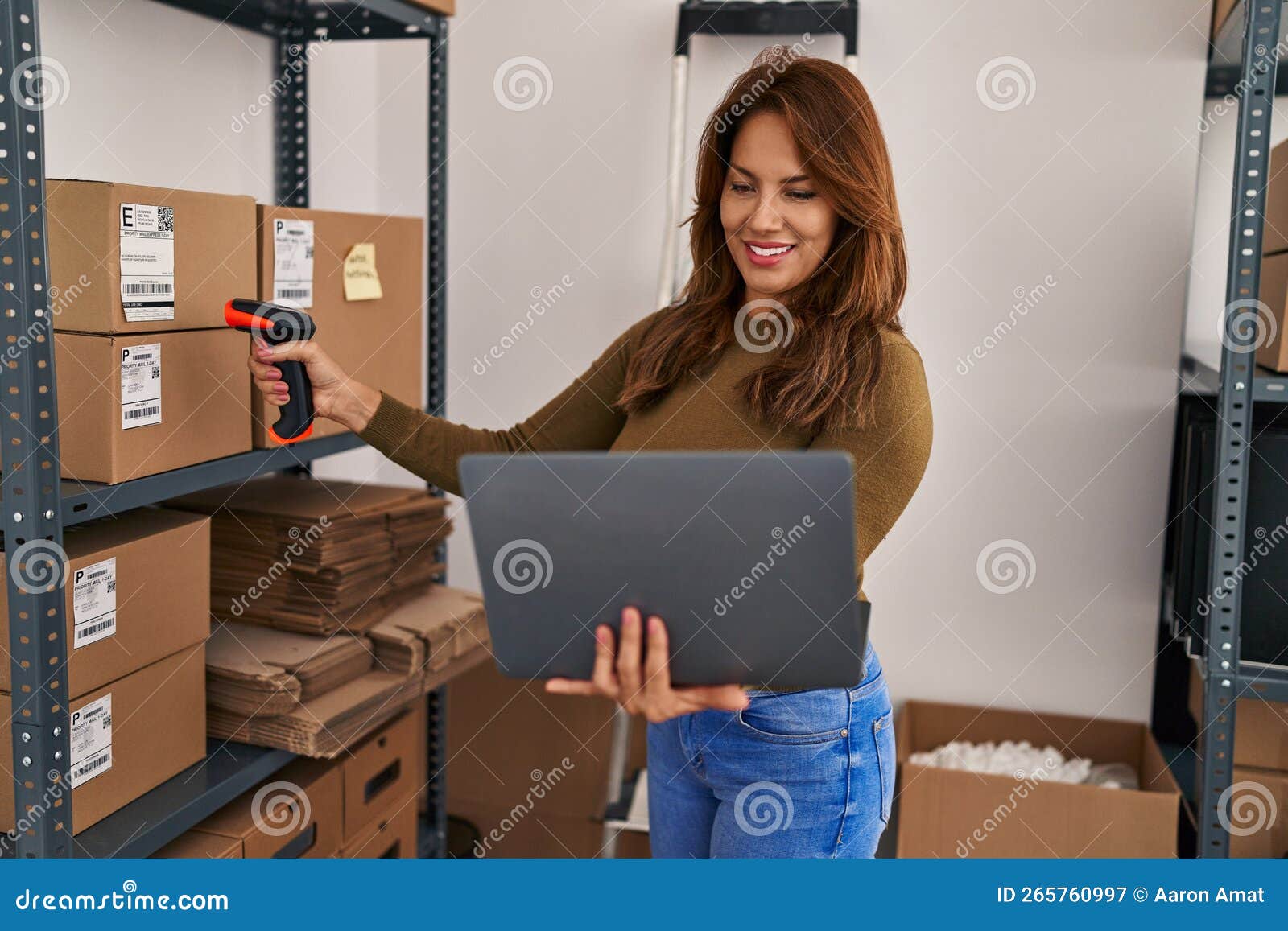 Young Latin Woman Business Worker Scanning Package Using Barcode Reader ...