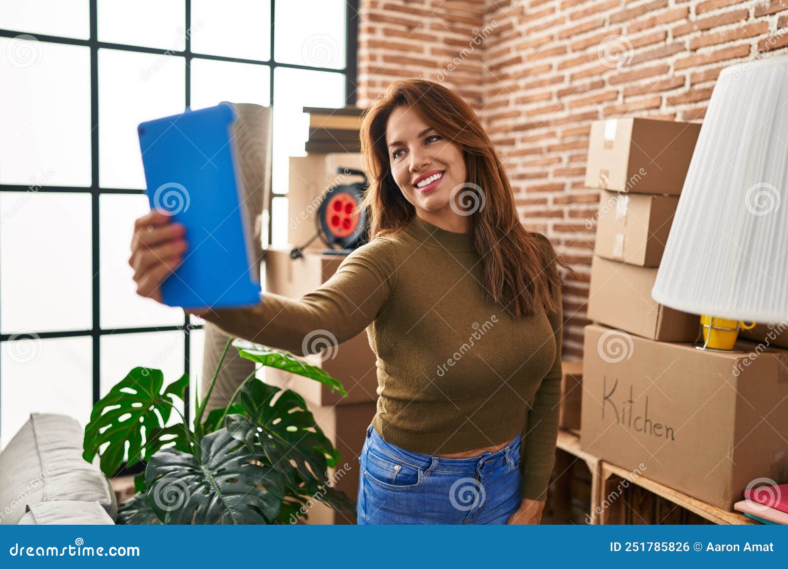 Young Latin Woman Make Selfie by the Touchpad at Hew Home Stock Photo ...