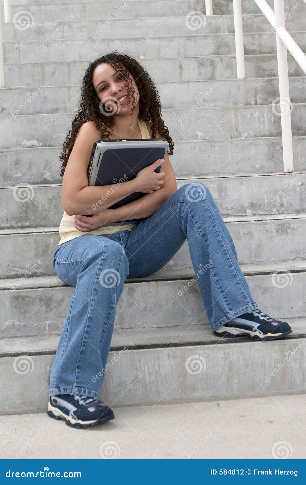 Young Latina Student Hugging Computer Stock Photo - Image of girl ...