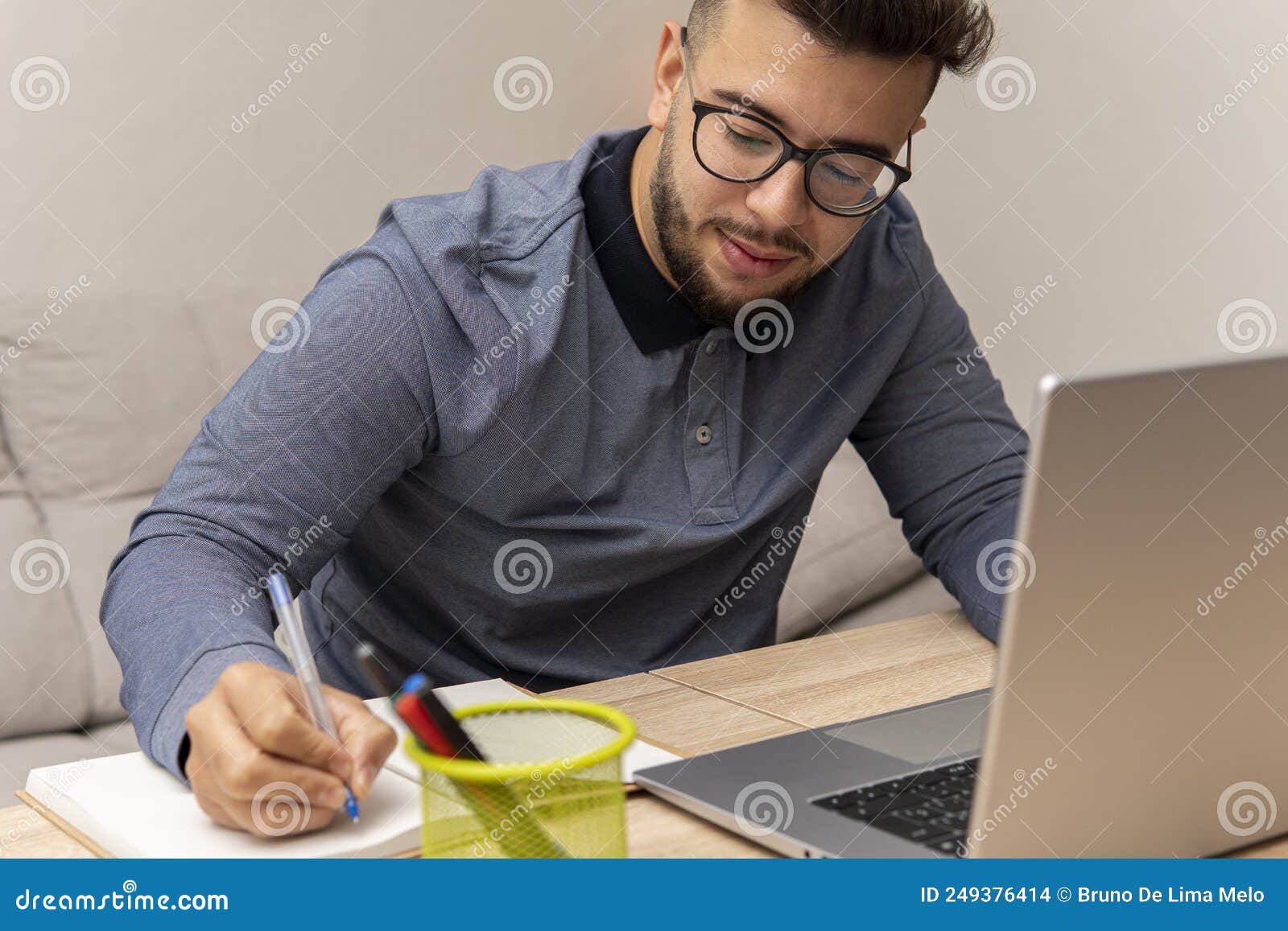 Young Latino Boy Doing Homework from Home Stock Photo - Image of casual ...