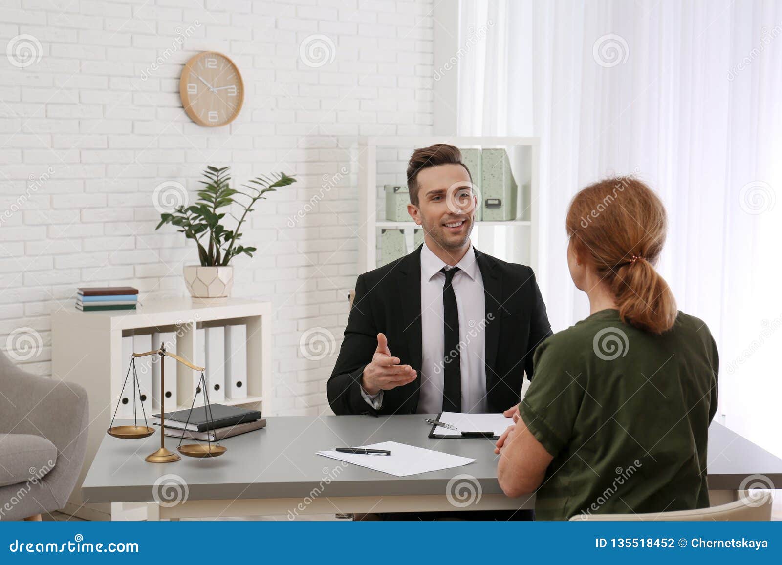 Young Lawyer Having Meeting with Senior Client Stock Photo - Image of ...
