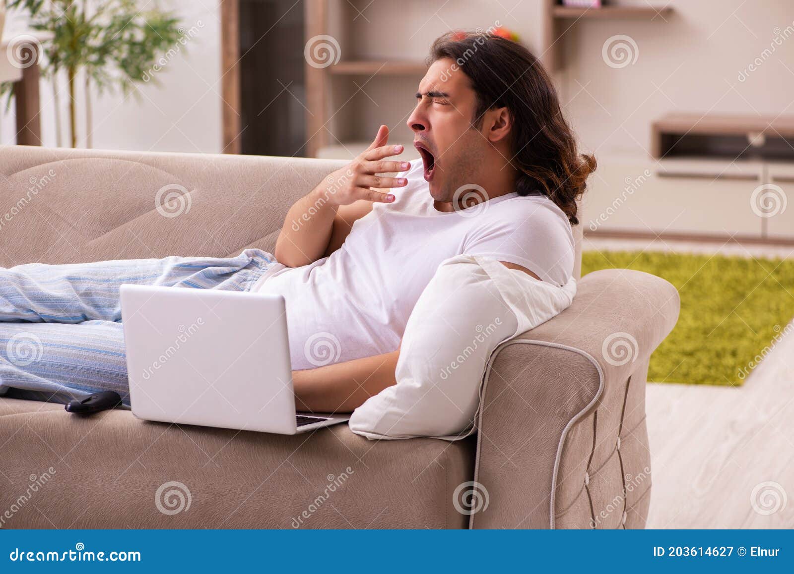 Young Lazy Man in Oversleeping Concept at Home Stock Image - Image of ...