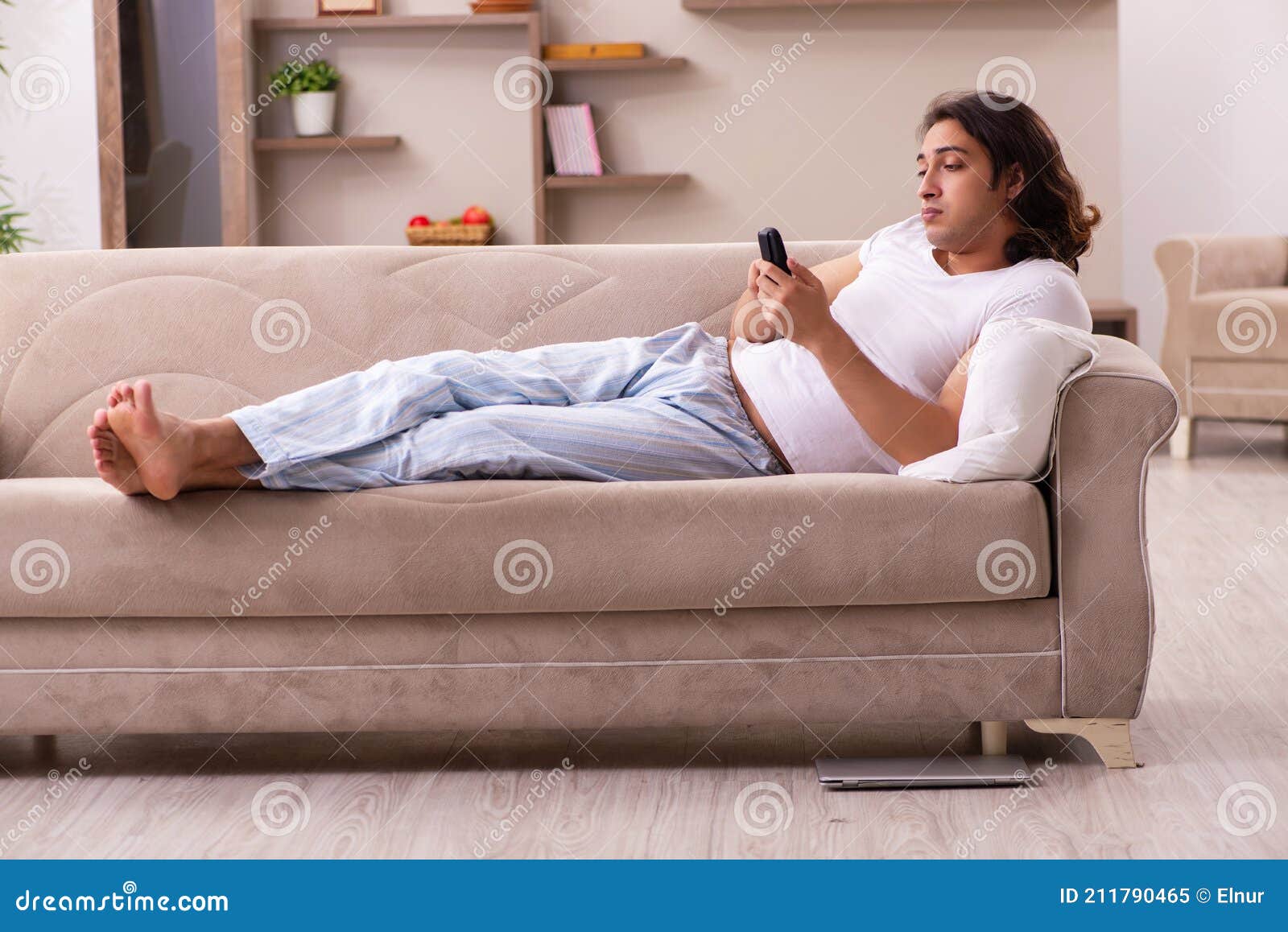 Young Lazy Man in Oversleeping Concept at Home Stock Image - Image of ...