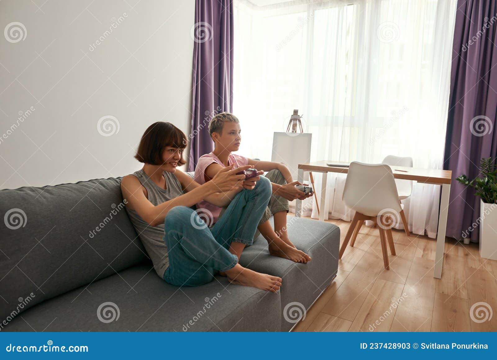 Young Lesbian Girls Play Video Game With Joysticks Stock Image Image