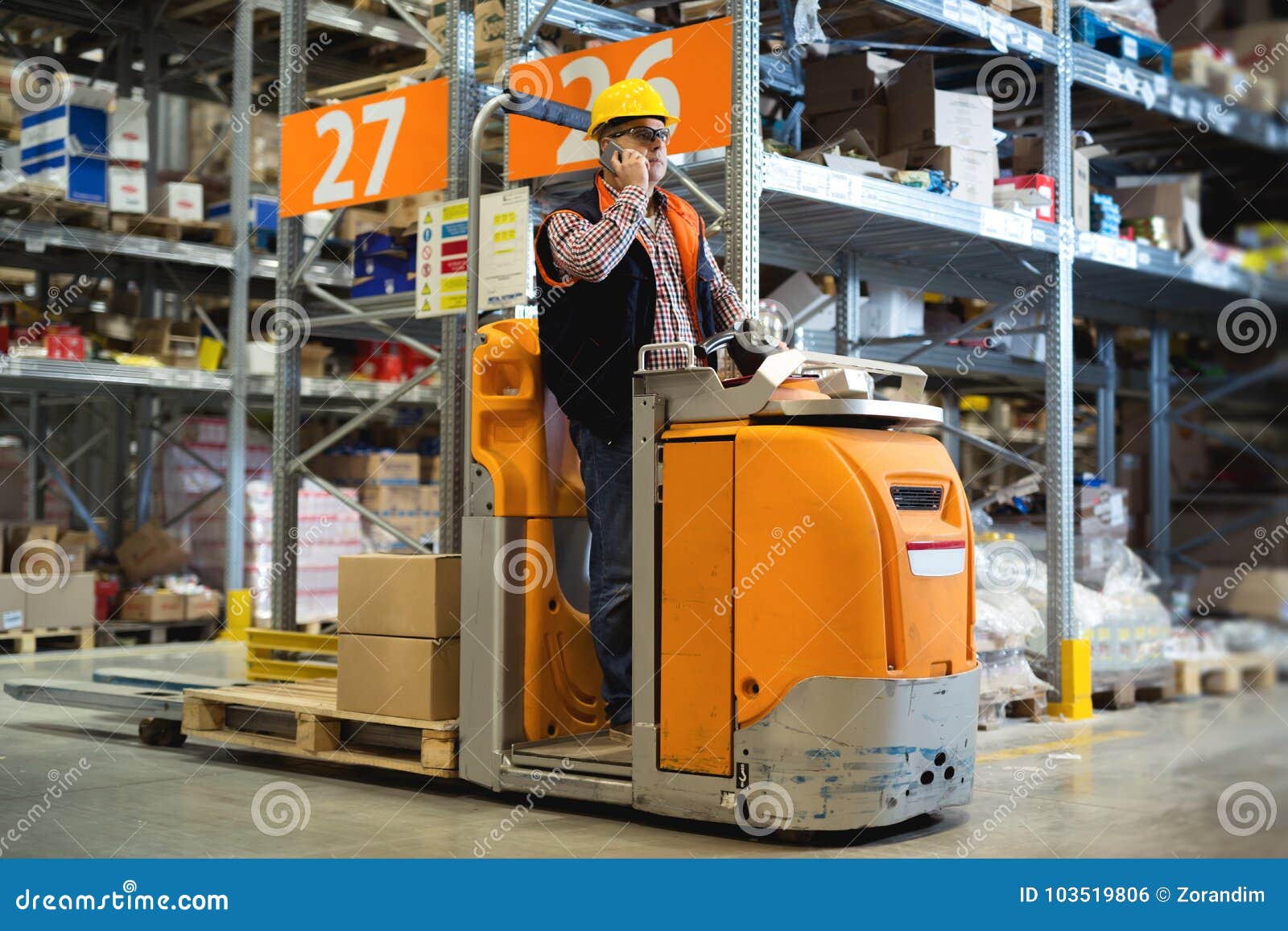 Man On Lift Operator In Uniform At Warehouse Stock Image ...