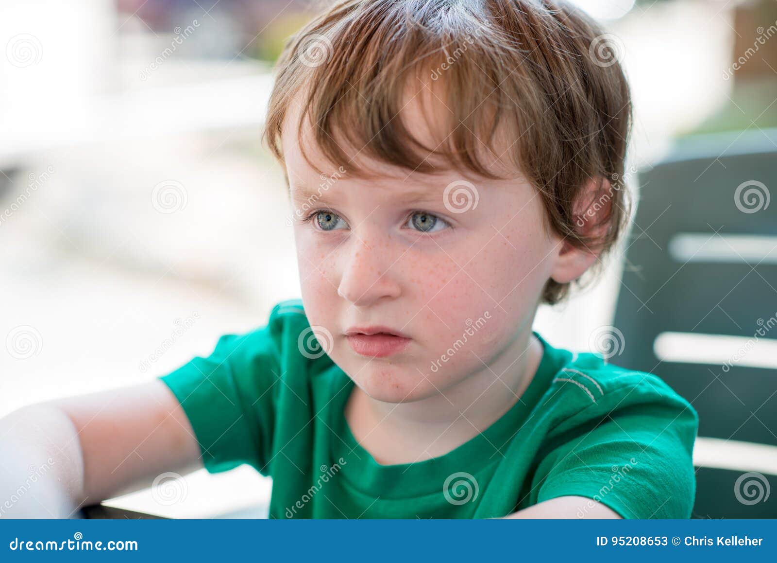 Young Little Boy Sitting Down Outside Stock Image - Image of cheerful ...