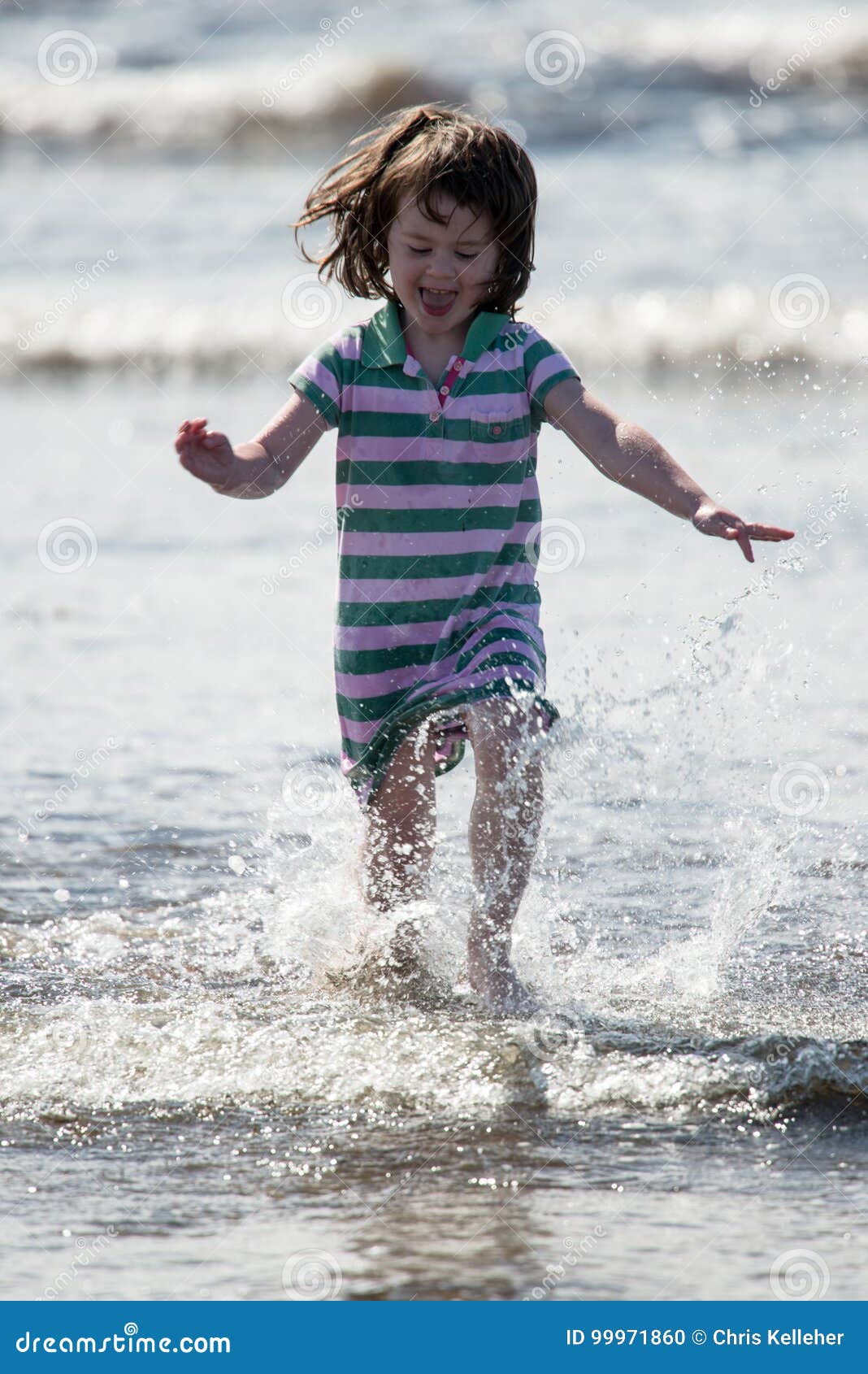 Young Little Girl on Beach Playing in the Surf Stock Photo - Image of ...