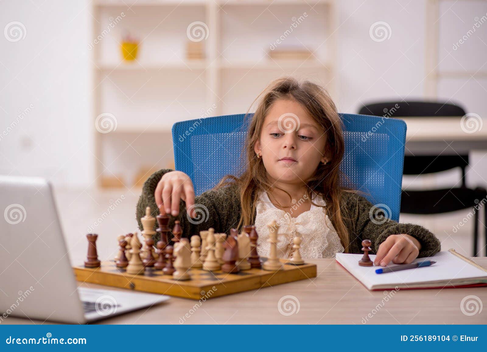 Young Little Girl Playing Chess at Home Stock Photo - Image of ...