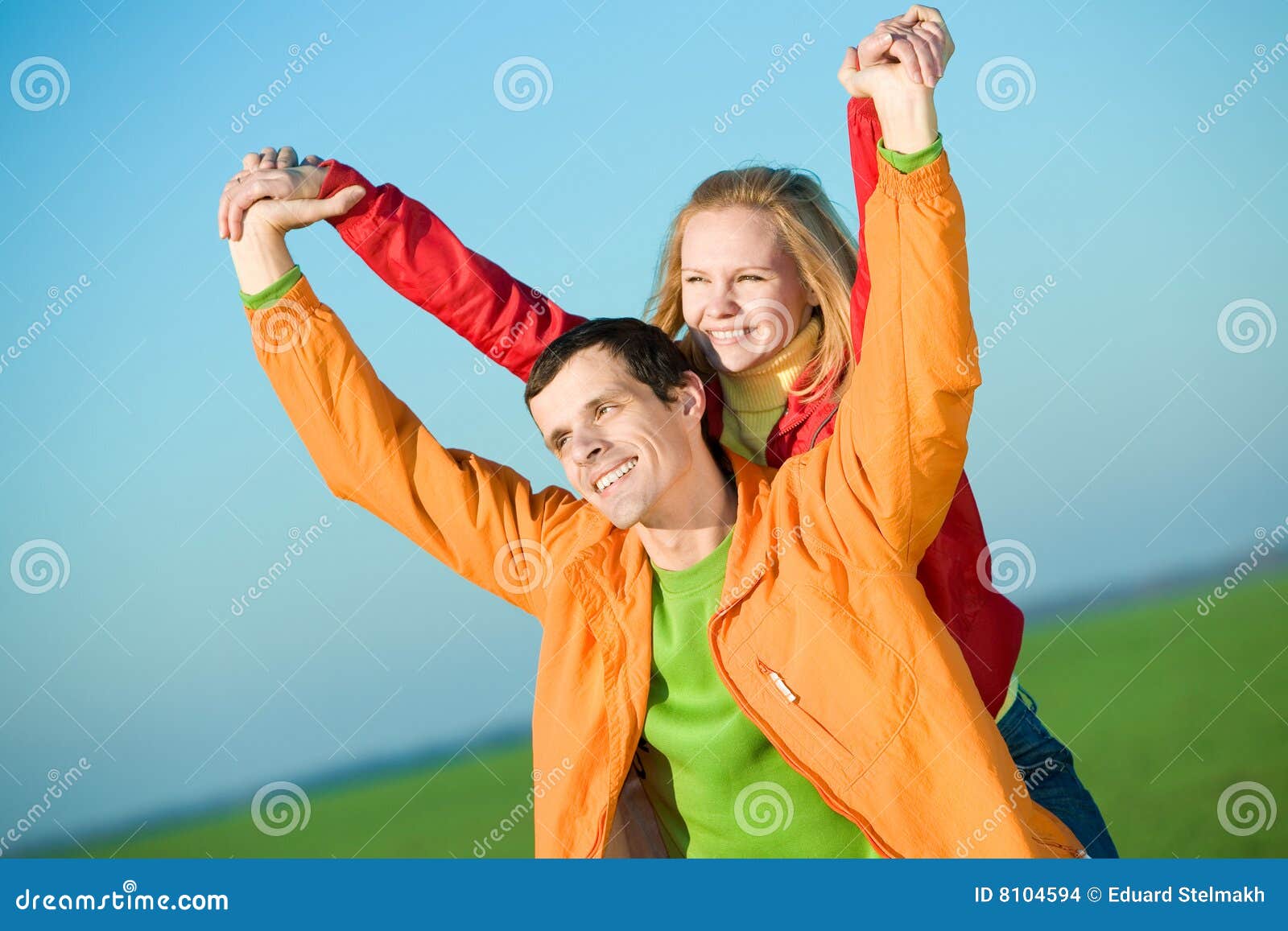 Young Love Couple Smiling Under Blue Sky Stock Photo - Image of laugh ...