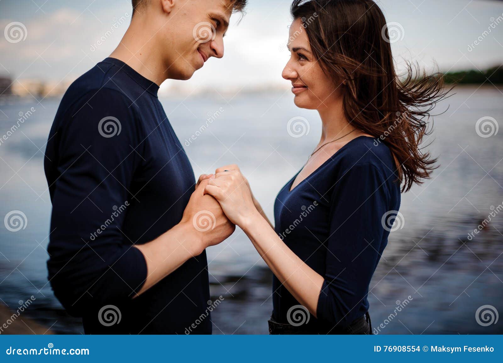 Young Lovers Looking at Each Other Stock Photo - Image of female, happy ...