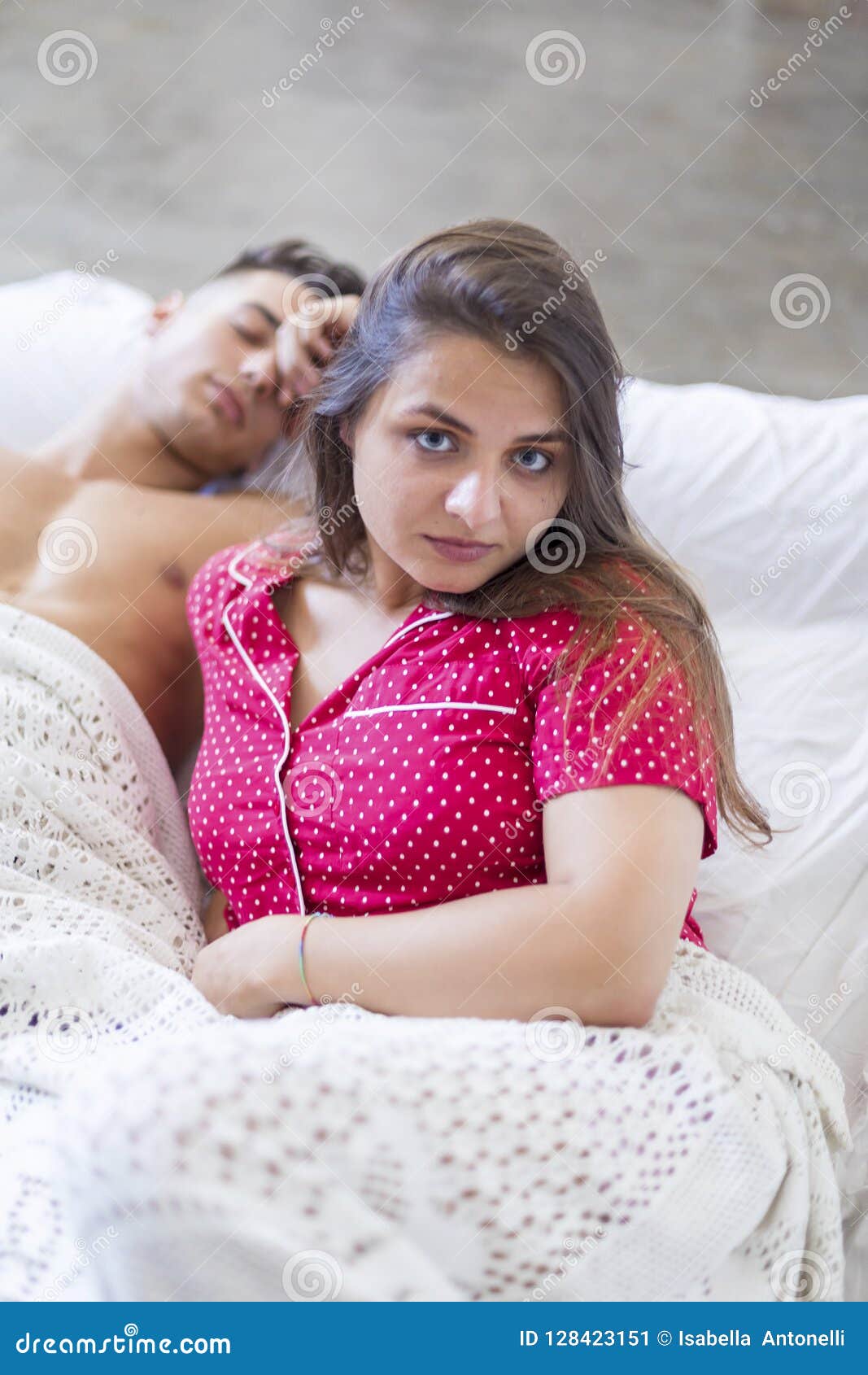 A Young Loving Couple in the Bed Stock Image - Image of bedroom ...