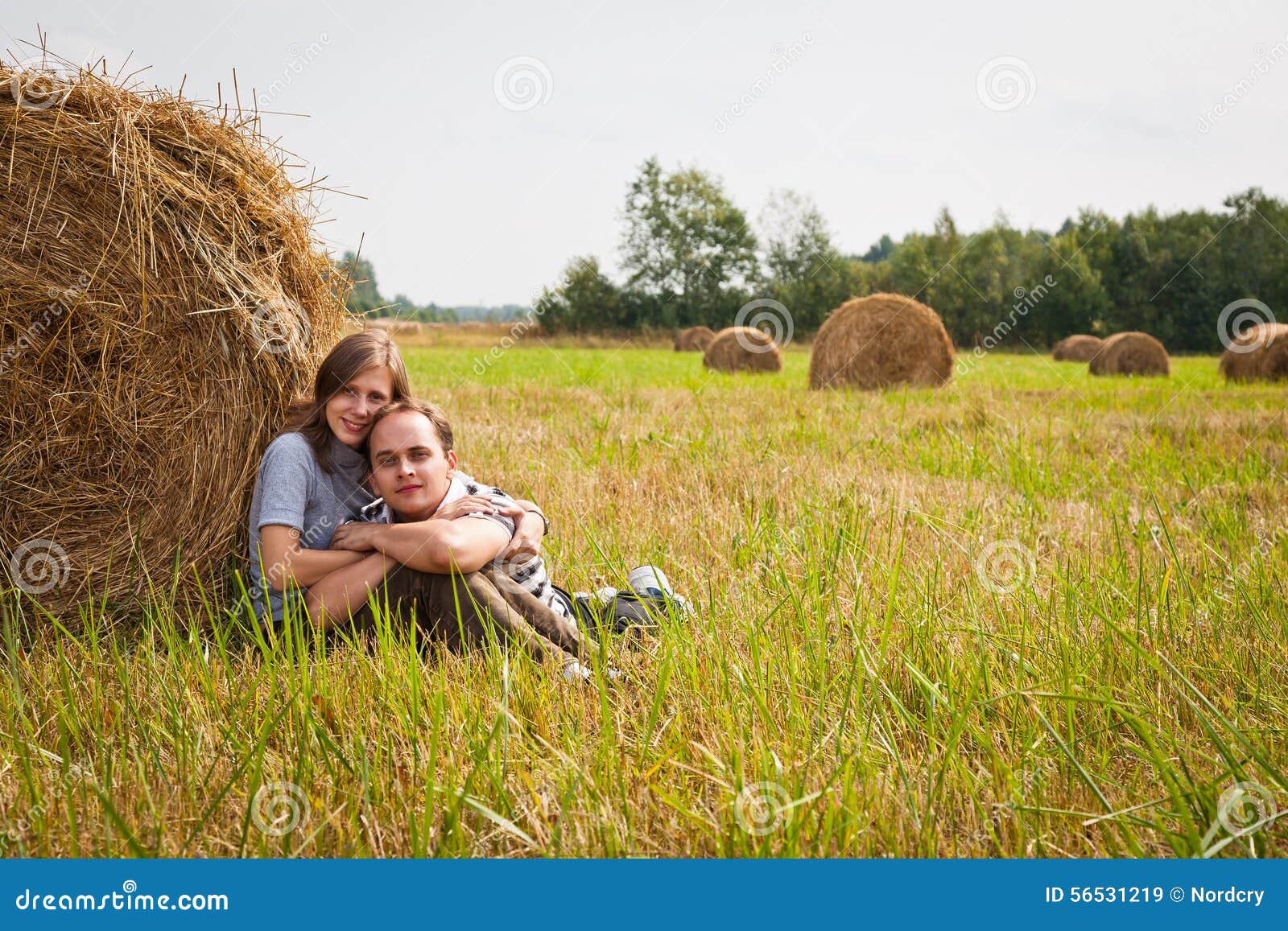 Young Loving Couple on the Haystack Stock Image - Image of young ...