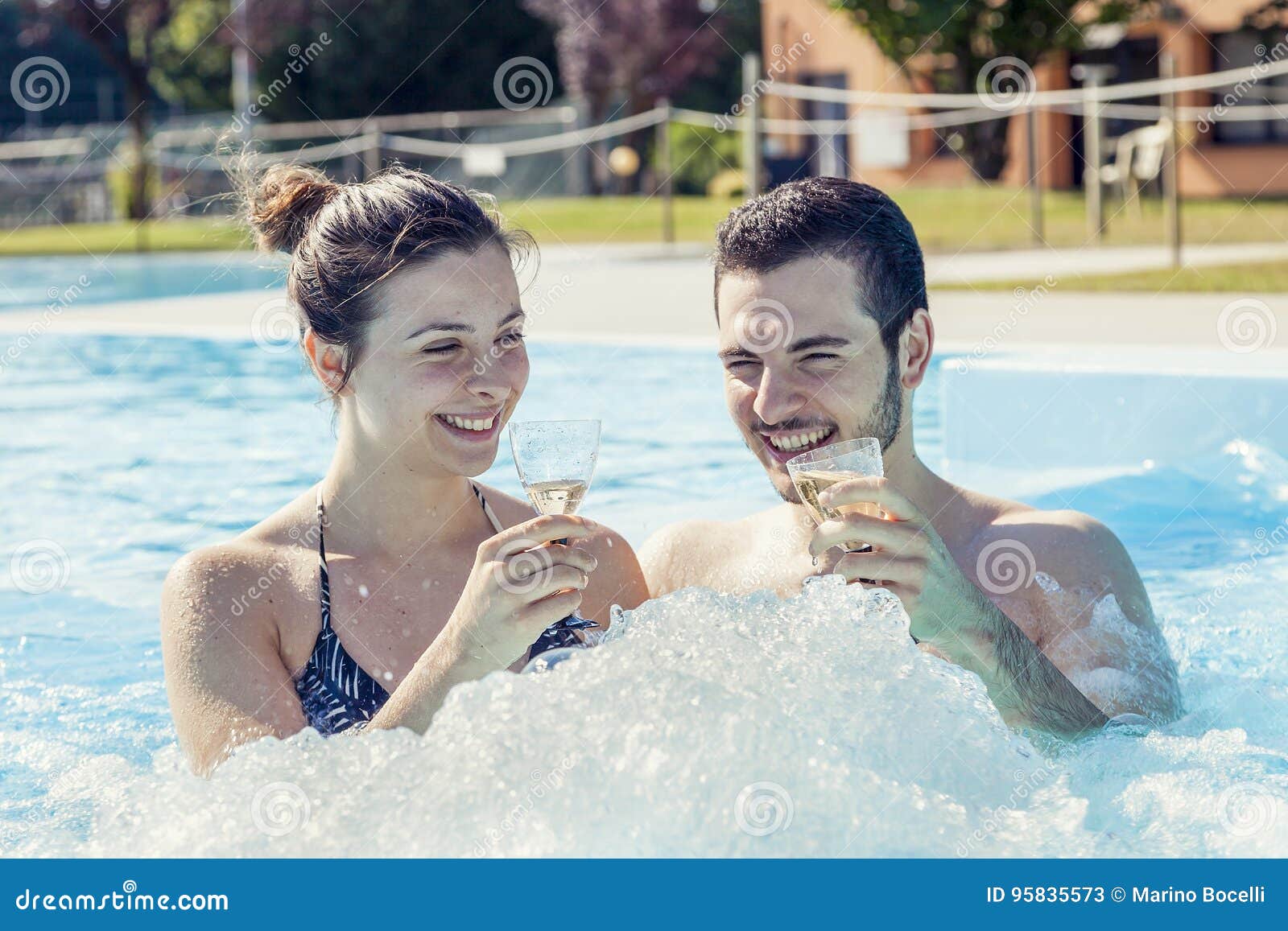 Young Loving Couple Relaxes And Drink Wine Stock Image Image Of