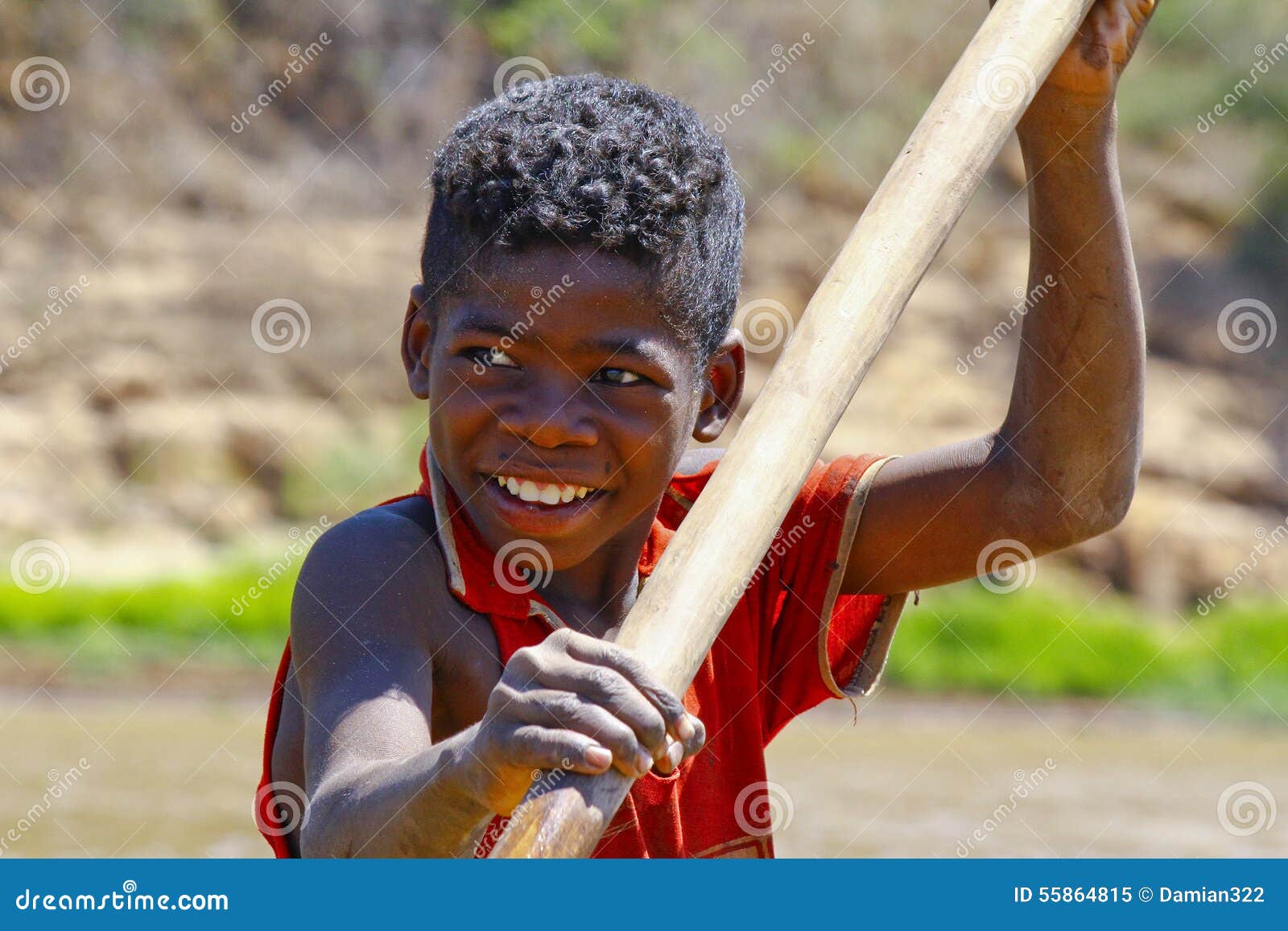 Young Malagasy African Boy Rowing Traditional Canoe Stock Image - Image ...