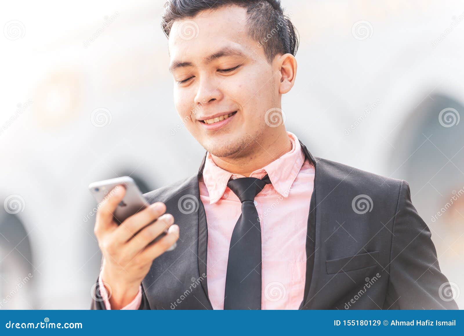 Young Malay Business Man on His Smartphone Stock Image - Image of adult ...