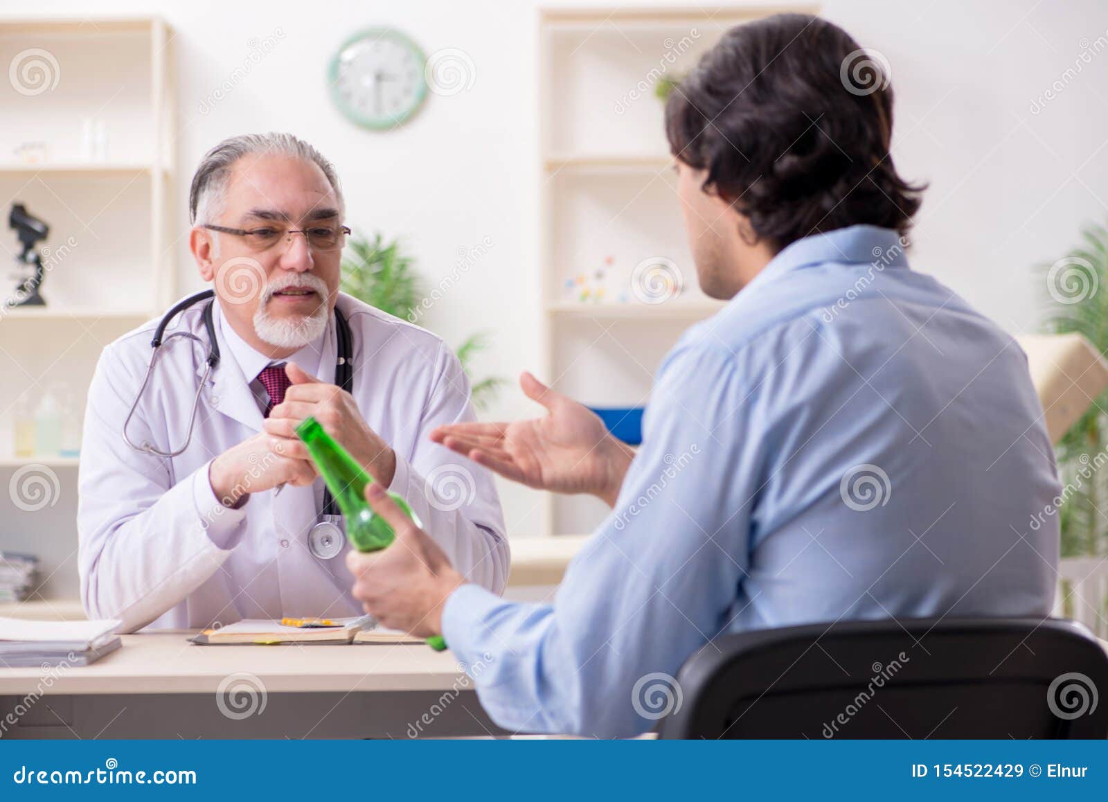 Young Male Alcoholic Visiting Old Doctor Stock Image - Image of ...