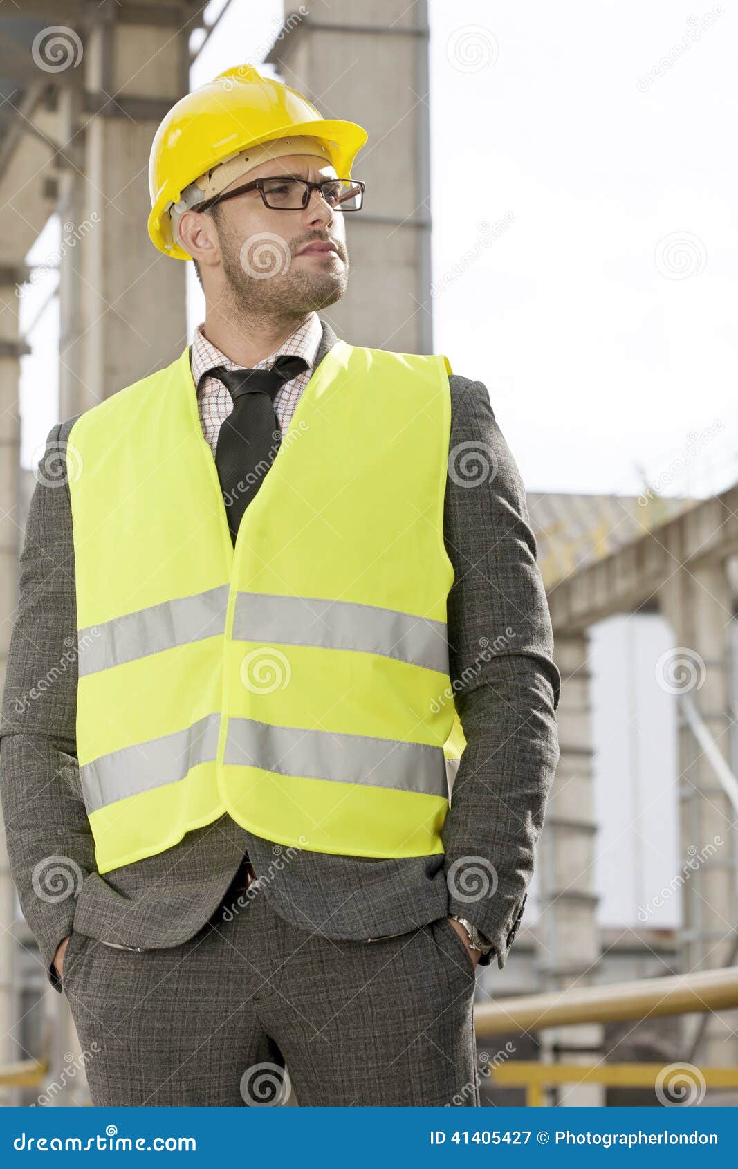 Young Male Architect in Protective Workwear Standing Hands in Pockets ...