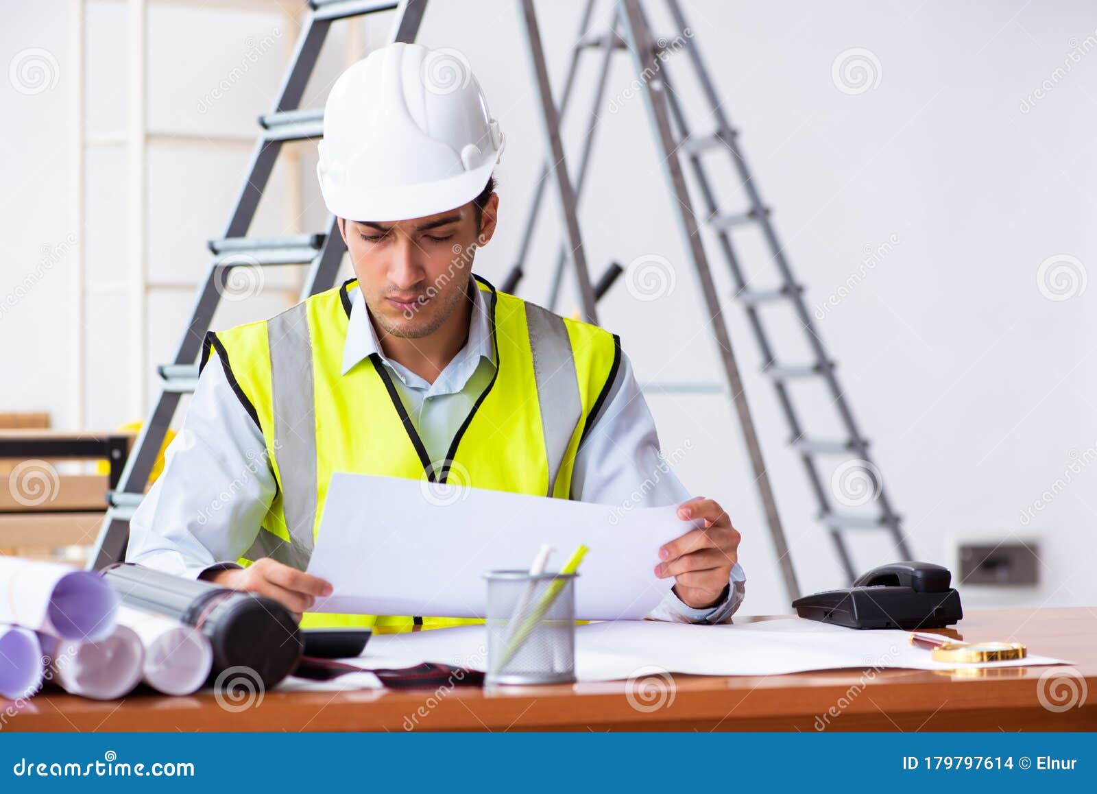 Young Male Architect Working Indoors Stock Photo - Image of male ... Young Male Architect Working Indoors Stock Photo - Image of male ...