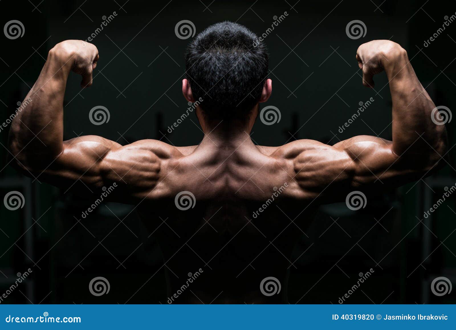 Young Male Athlete Flexing Back Muscles Stock Photo - Image of lighting ...