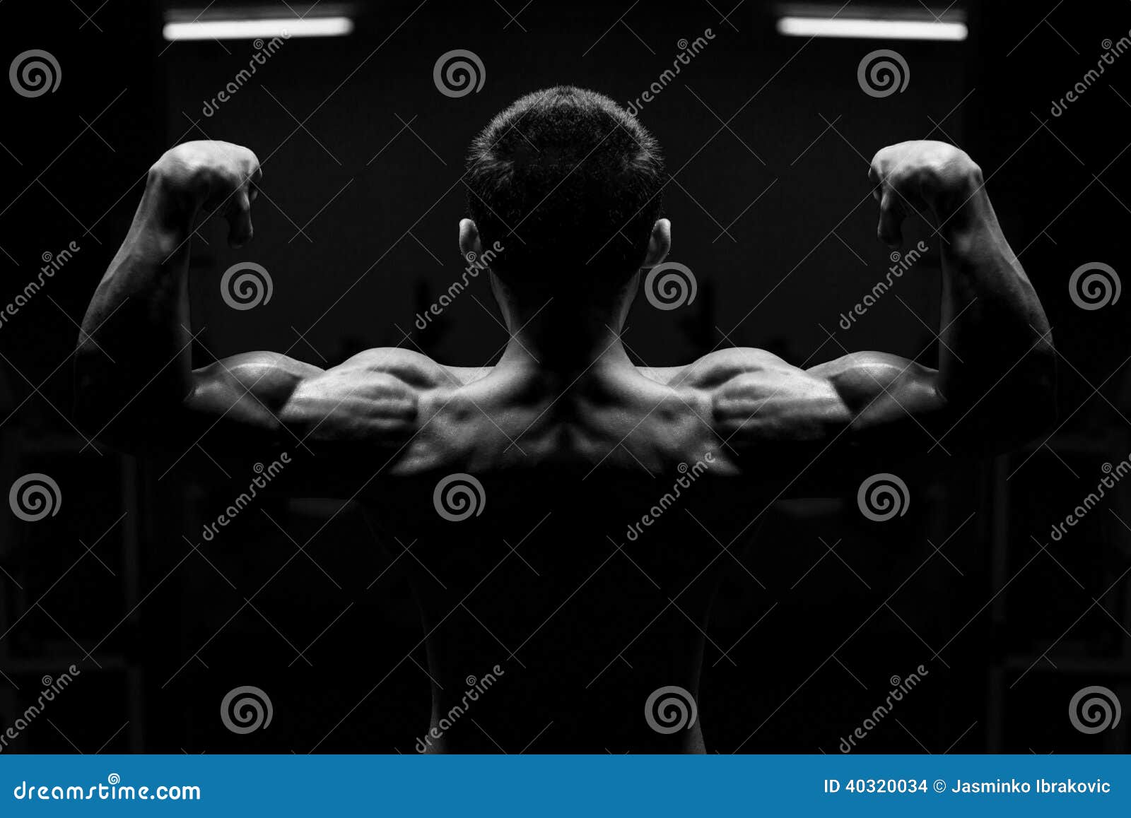 Young Male Athlete Flexing Back Muscles Stock Photo - Image of muscle ...
