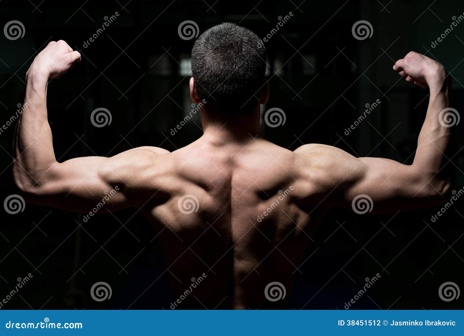 Young Male Athlete Flexing Back Muscles Stock Photo - Image of ...