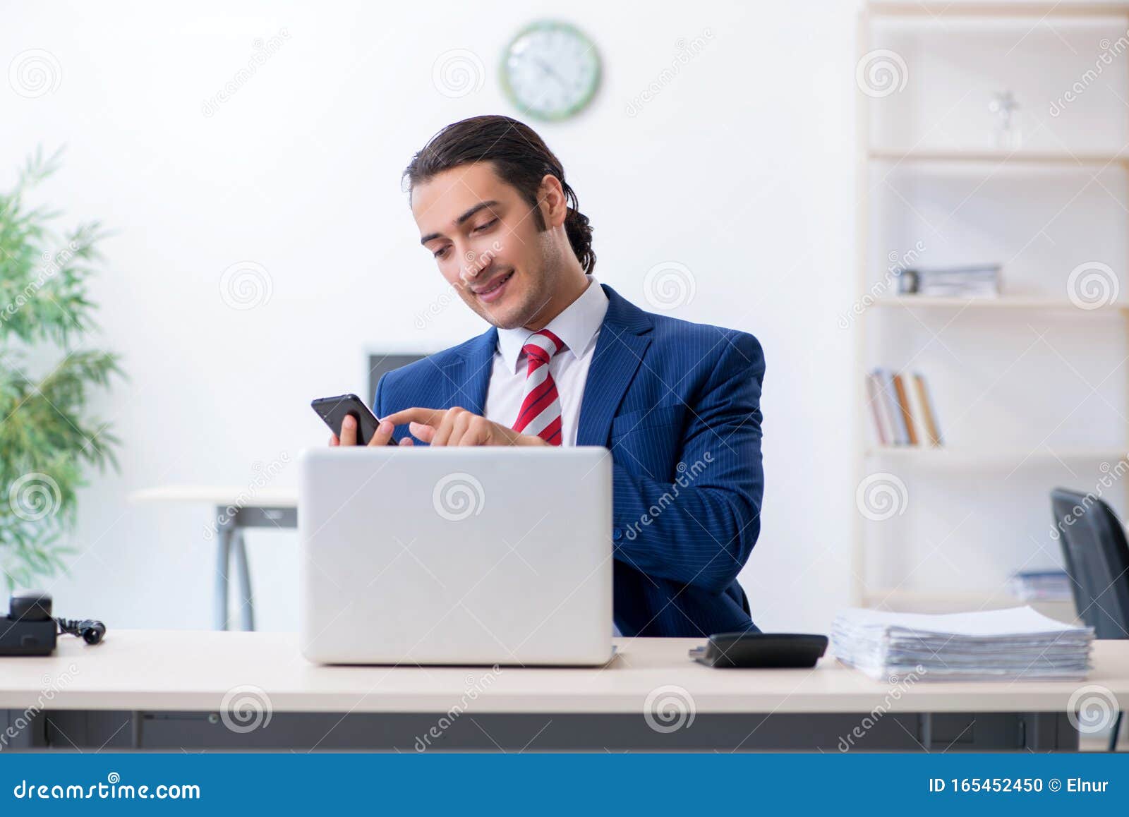 Young Male Businessman Sitting in the Office Stock Photo - Image of ...