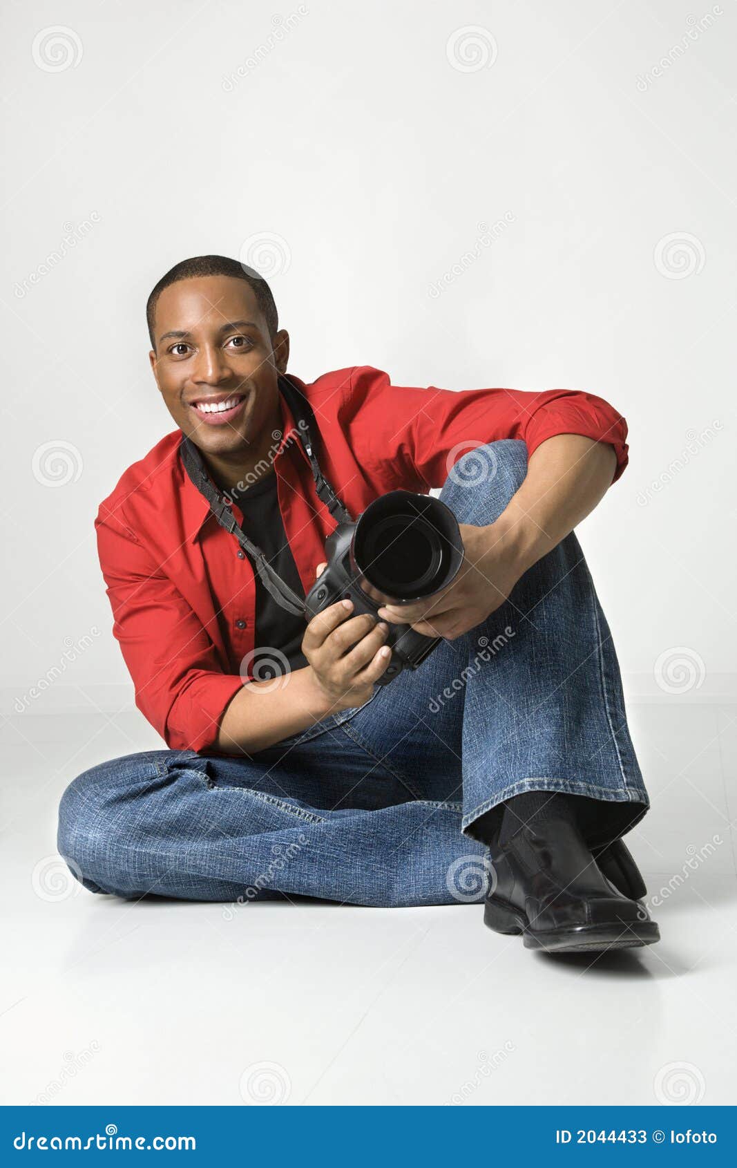 Young male with a camera. stock image. Image of work, profession - 2044433