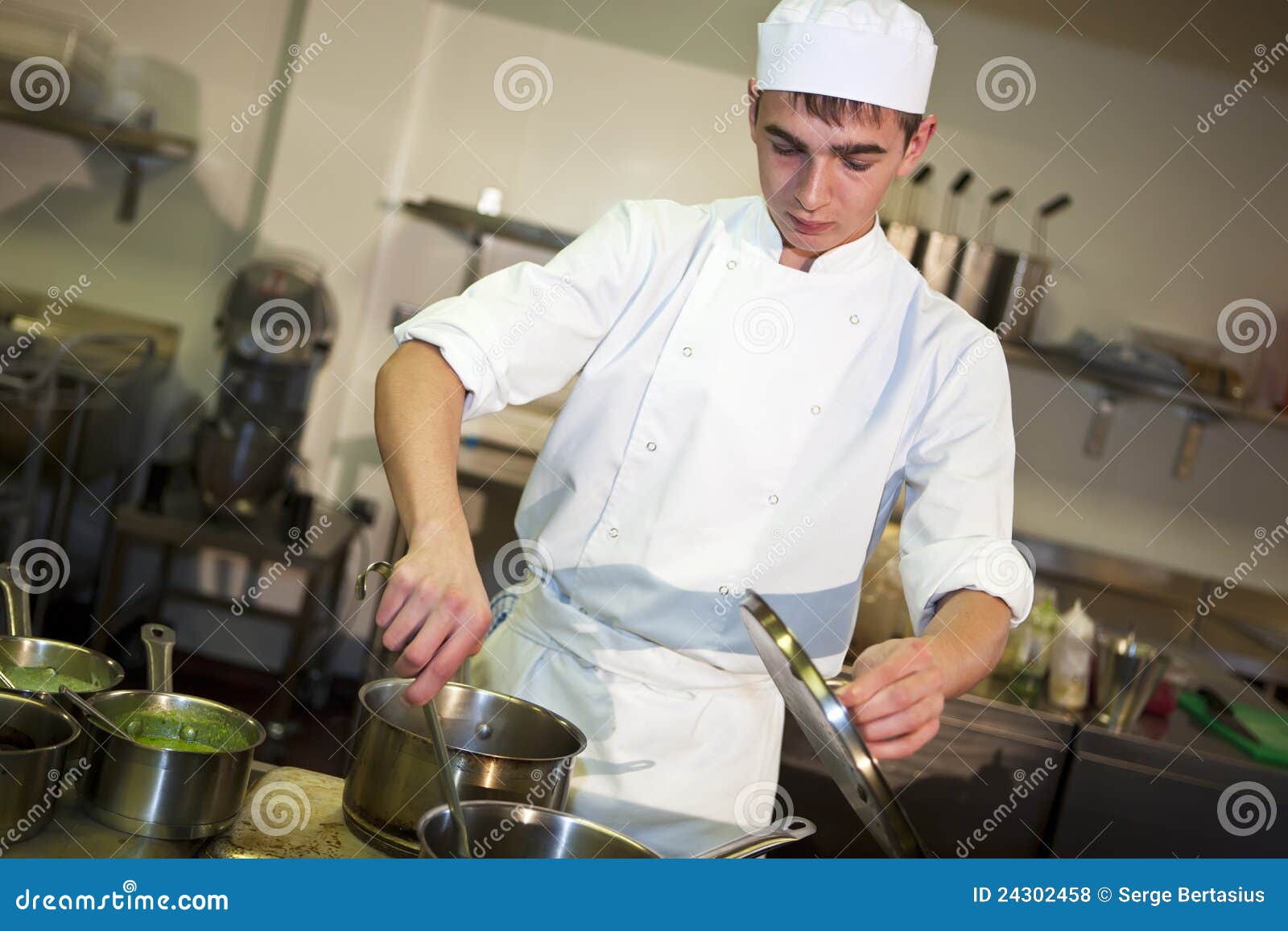 Young Male Chef Cooking Meal Stock Photo - Image of experience, adult ...