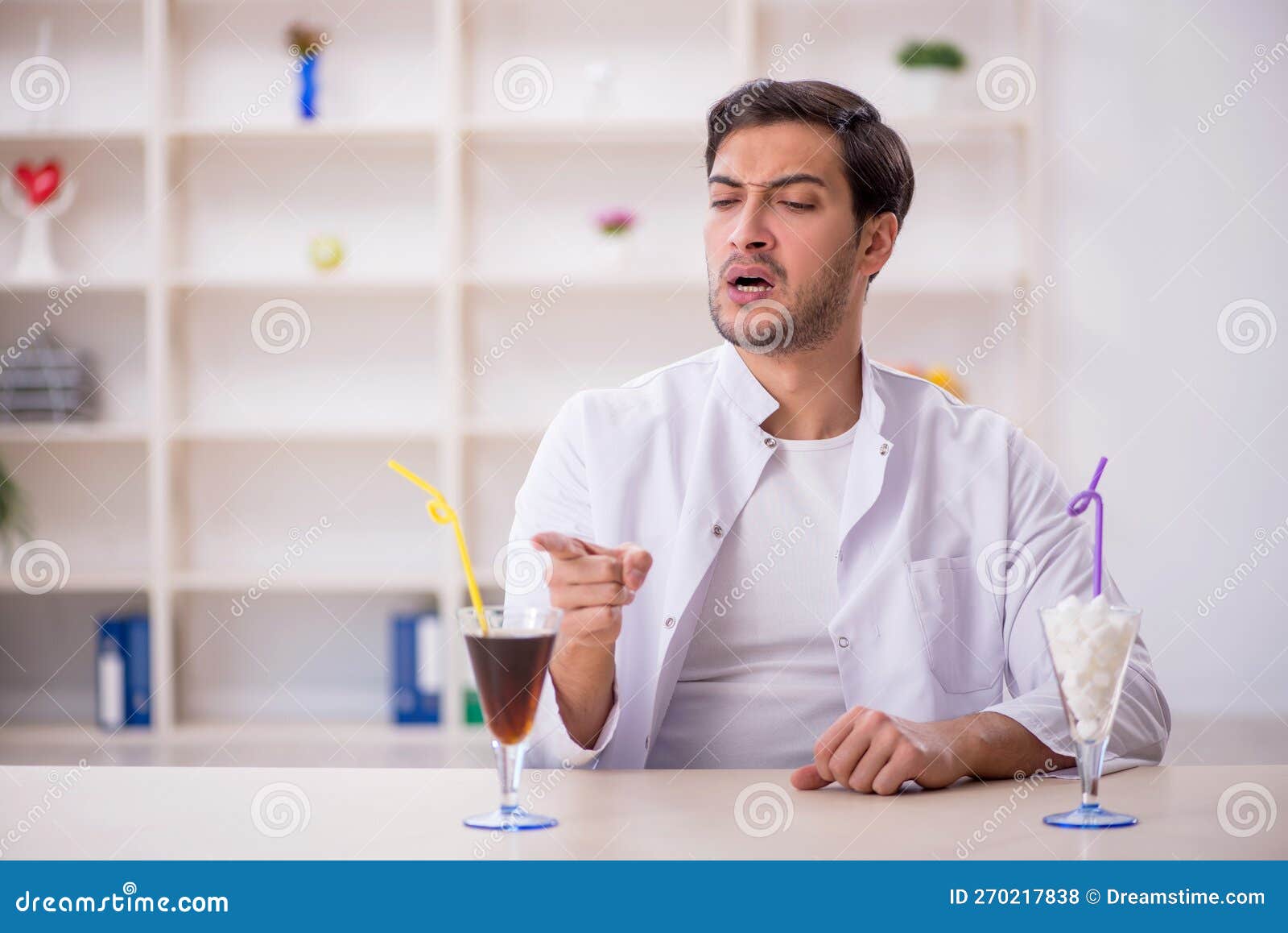 Young Male Chemist Examining Soft Drink at the Lab Stock Photo - Image ...