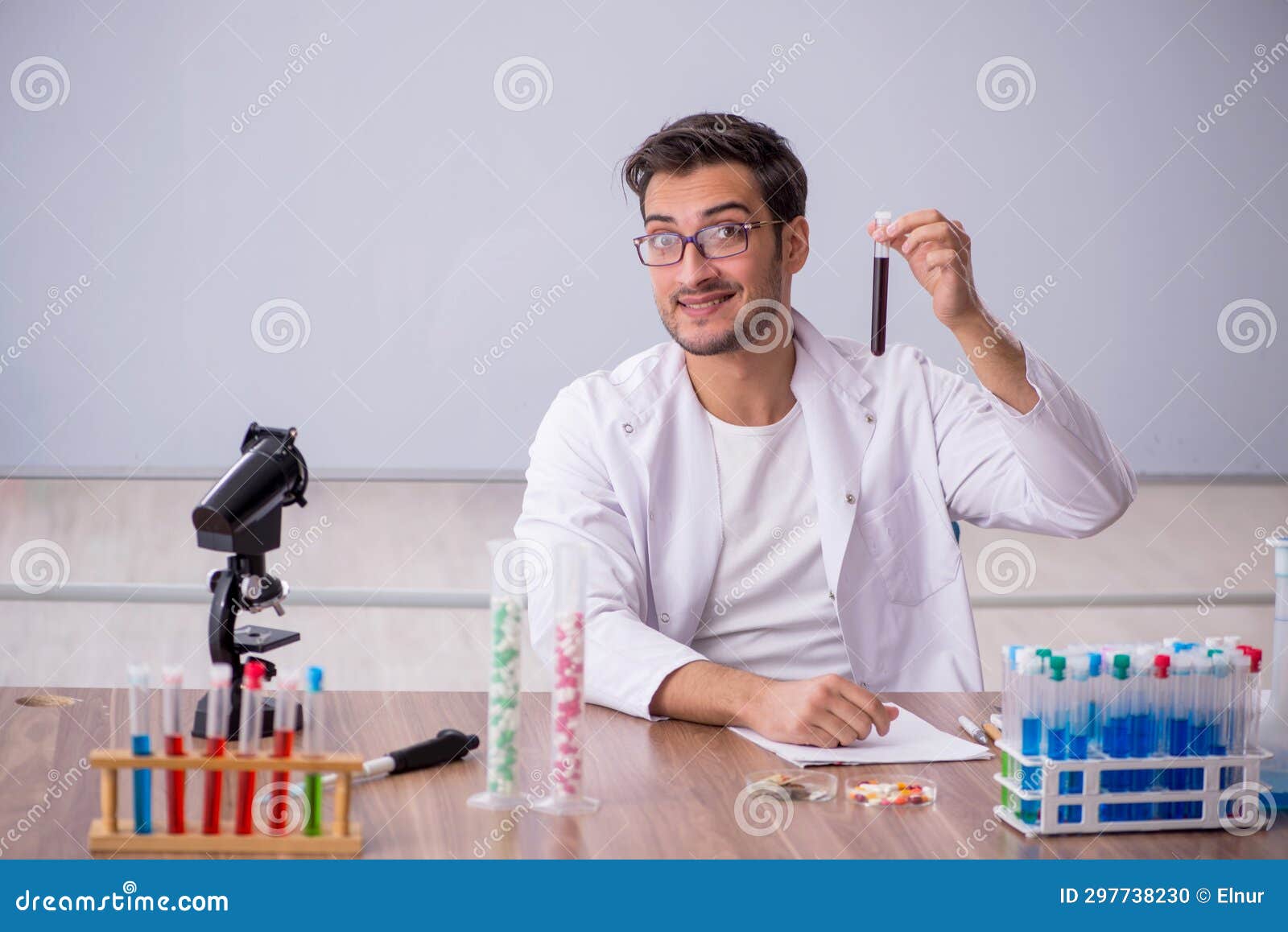 Young Male Chemist in Front of White Board Stock Photo - Image of ...