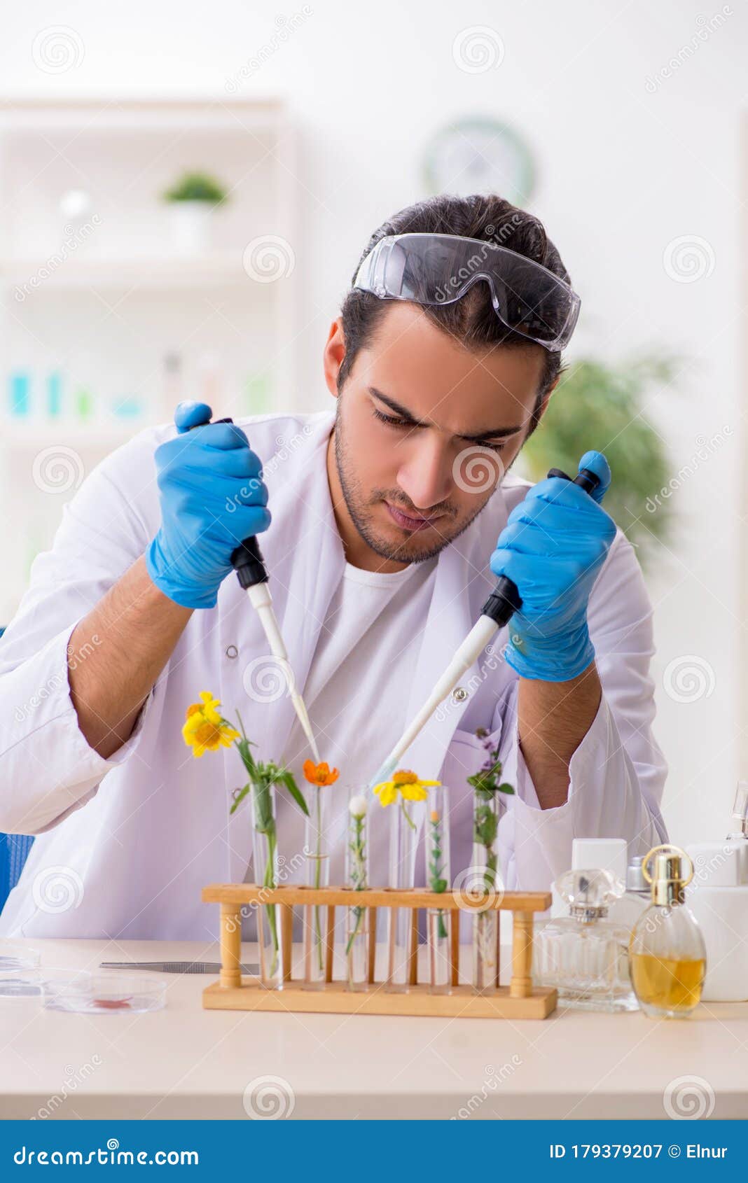 Young Male Chemist in Perfume Synthesis Concept Stock Image - Image of ...