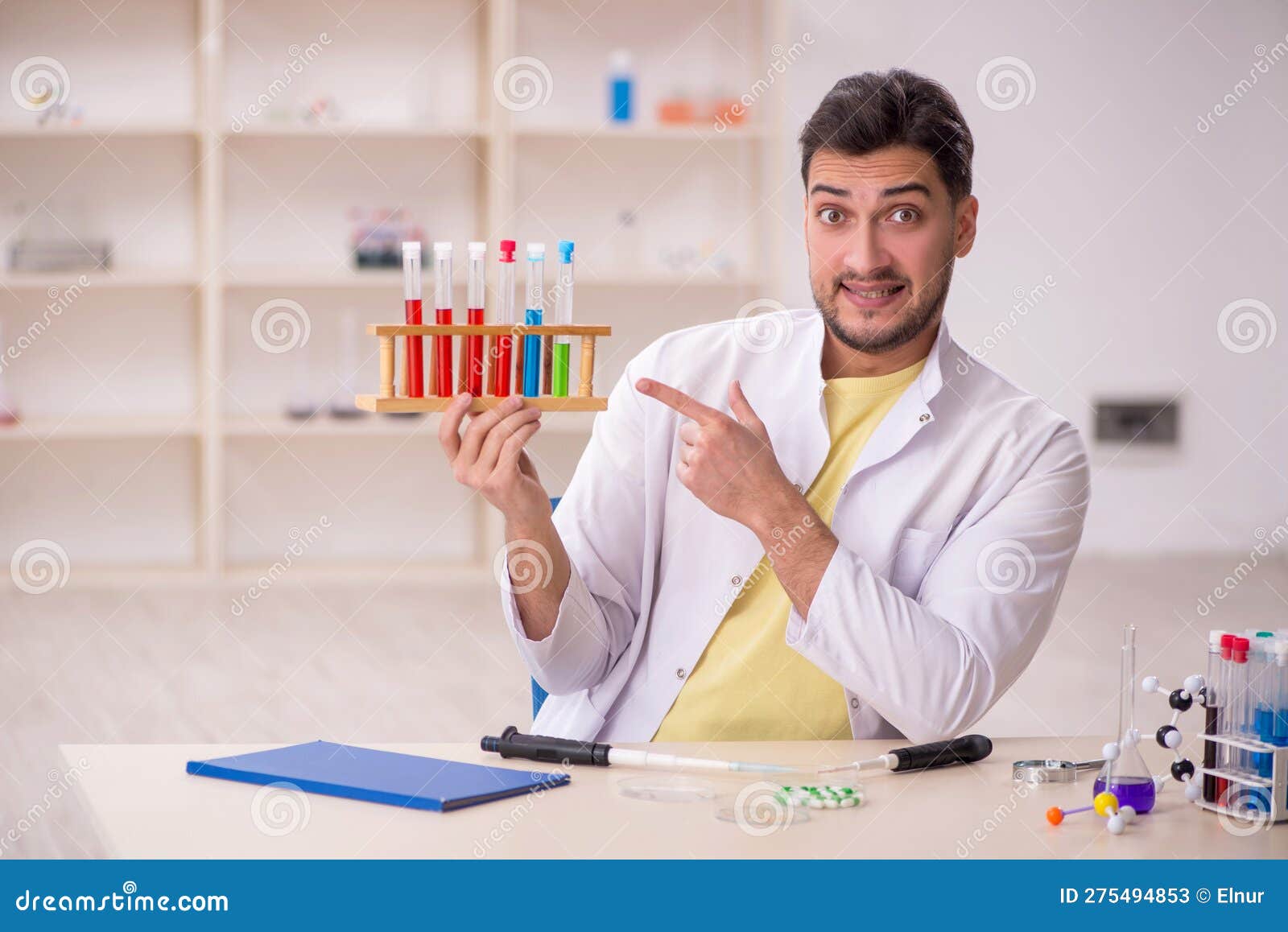 Young Male Chemist Sitting at the Lab Stock Image - Image of showing ...