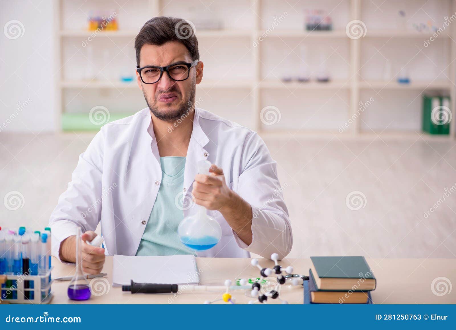 Young Male Chemist Sitting at the Lab Stock Image - Image of medicine ...