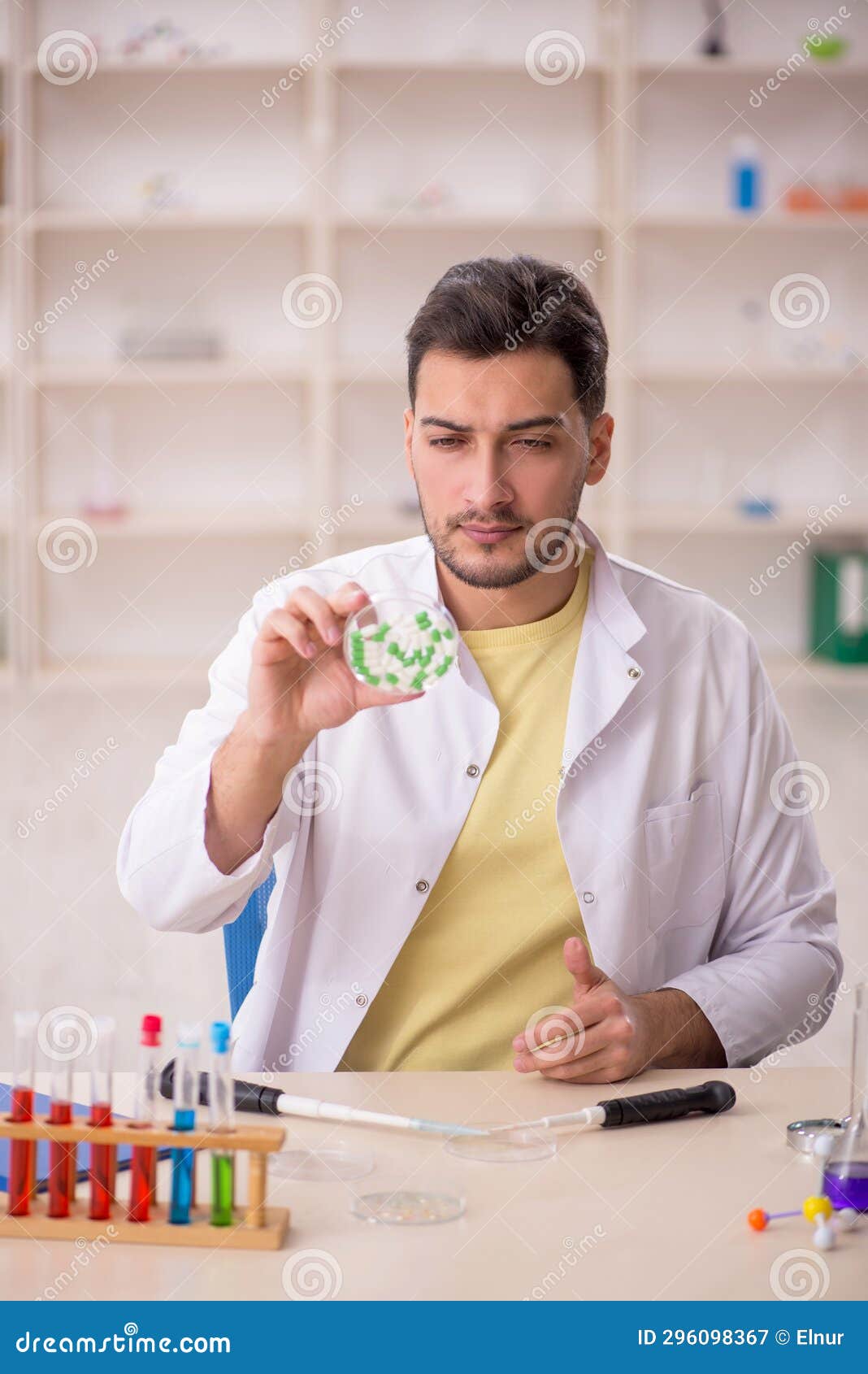 Young Male Chemist Sitting at the Lab Stock Image - Image of analysis ...